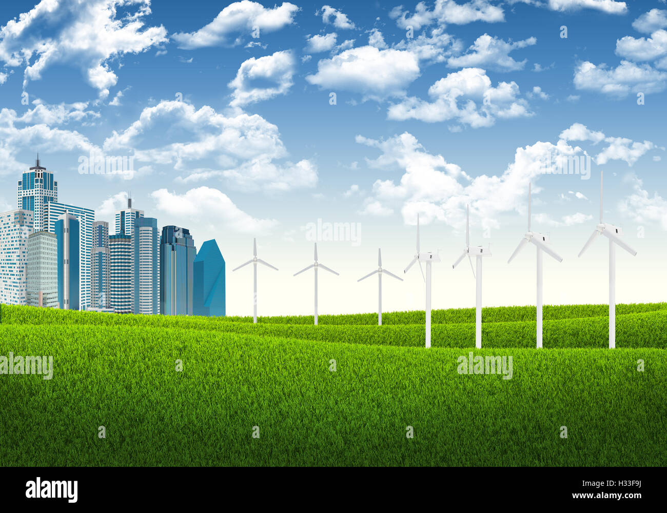 Blue sky, green grass and skyscrapers Stock Photo - Alamy