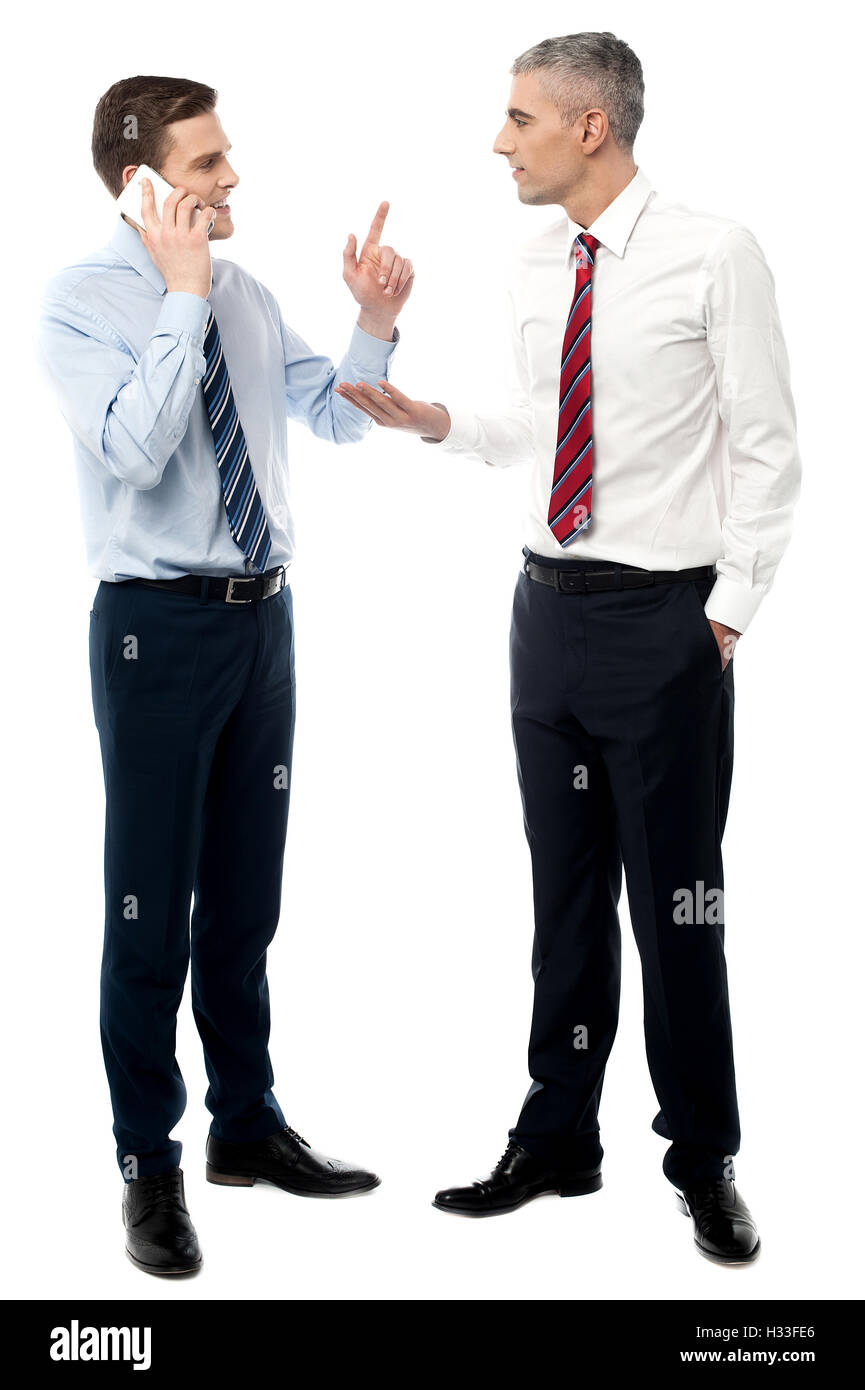 Conversation in office two Cut Out Stock Images & Pictures - Alamy