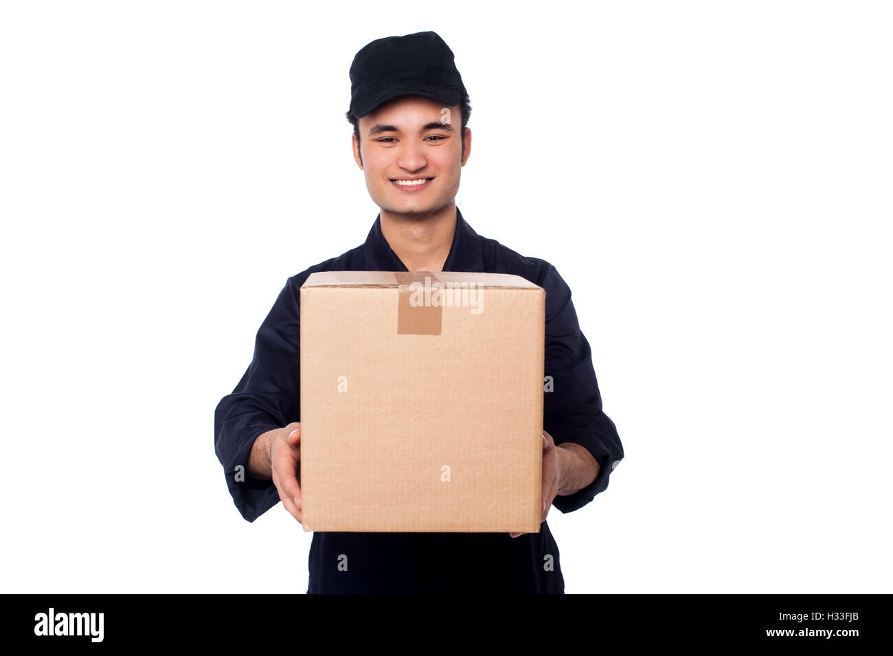 Young boy delivering parcel safely Stock Photo - Alamy