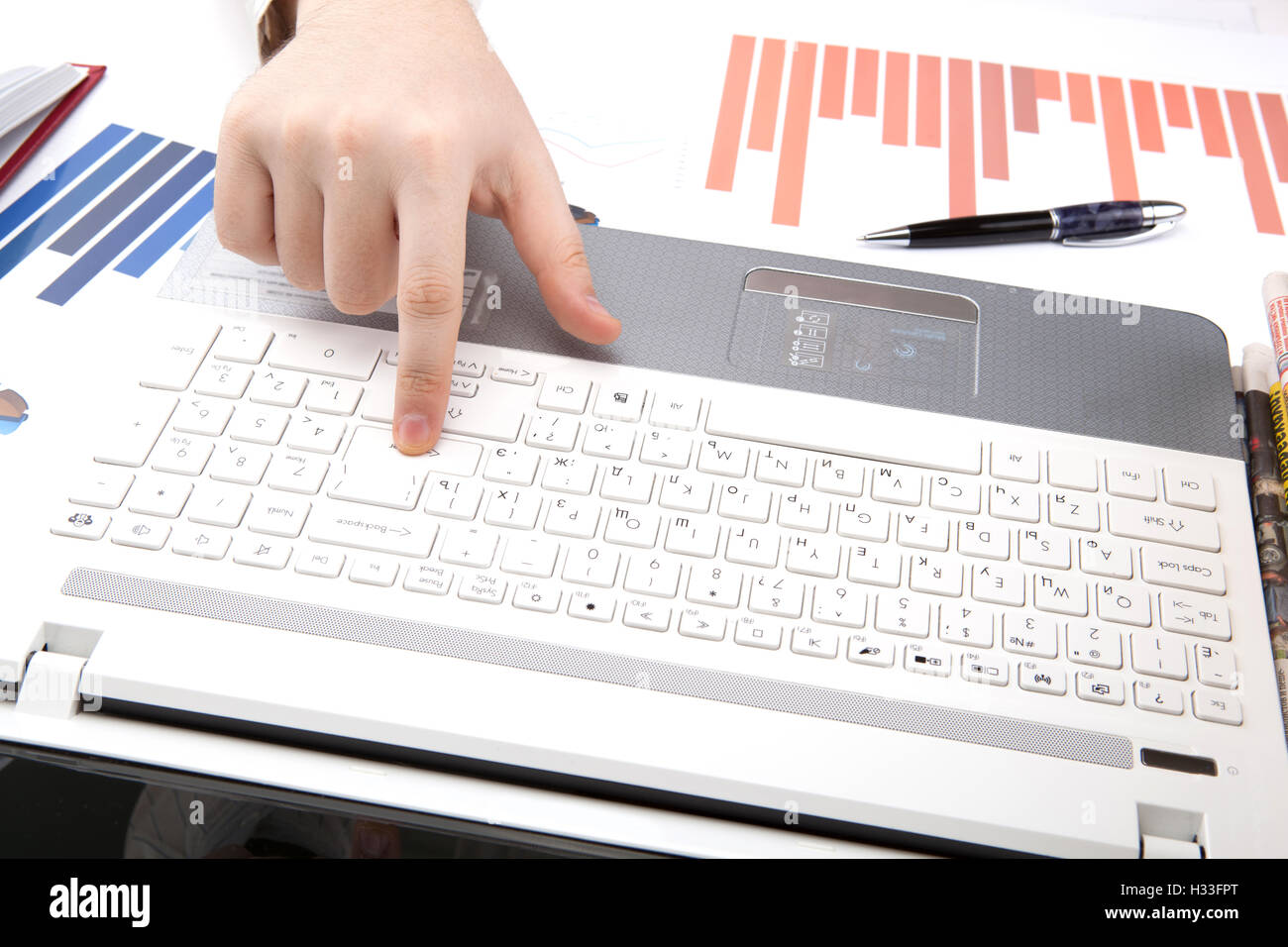 human hands on the notebook keyboard Stock Photo - Alamy