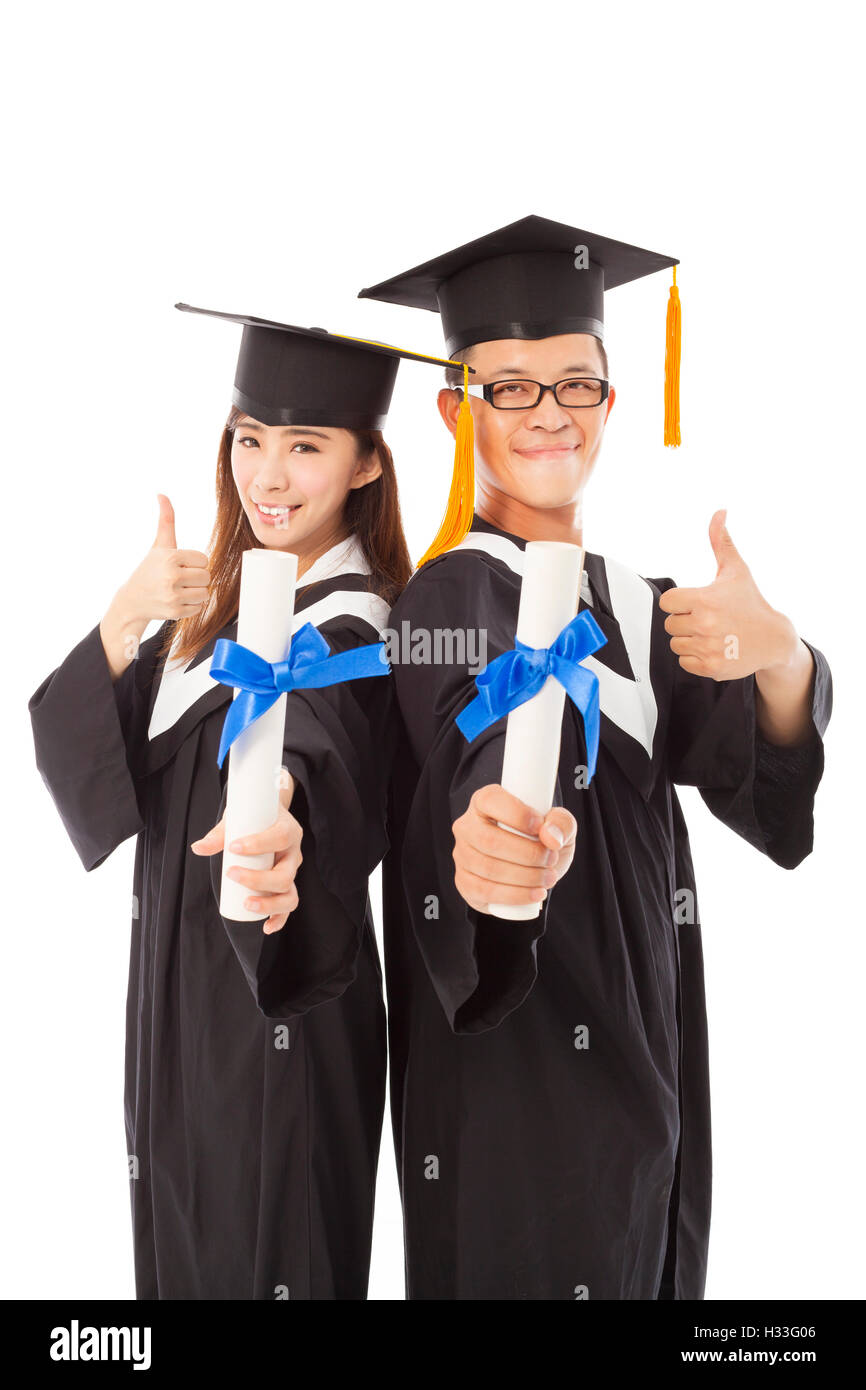 happy graduating students with thumb up Stock Photo - Alamy