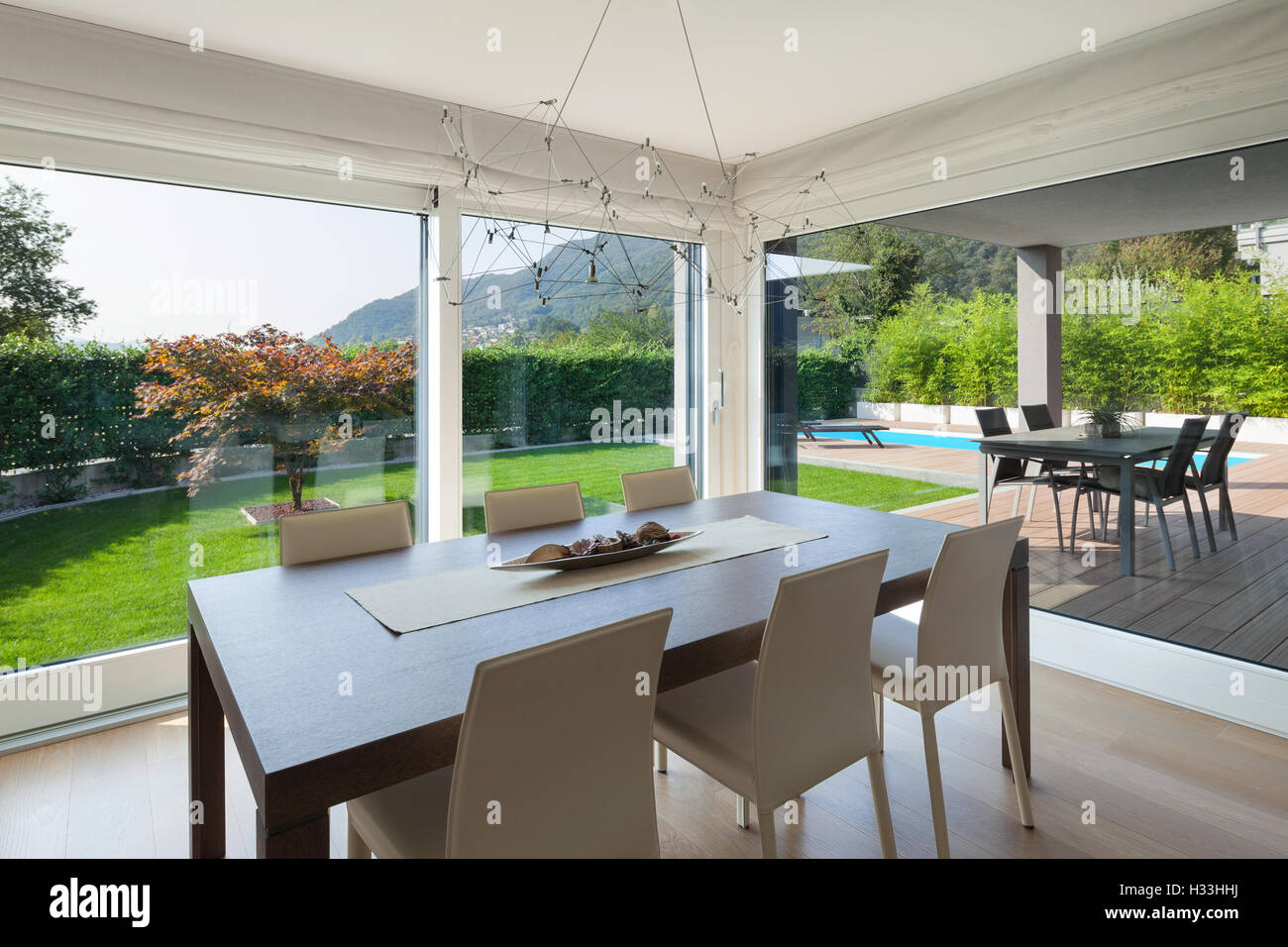 Luxury home interior, comfortable dining room, modern furniture Stock ...