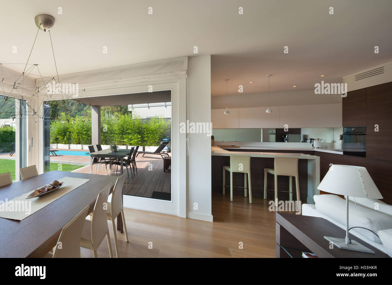 Wide open space of luxury house, veranda and garden view from the ...