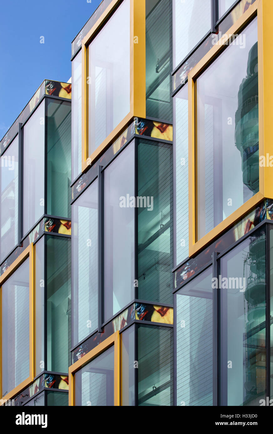 Detailed facade perspective with gold anodized window frames. 46 ...