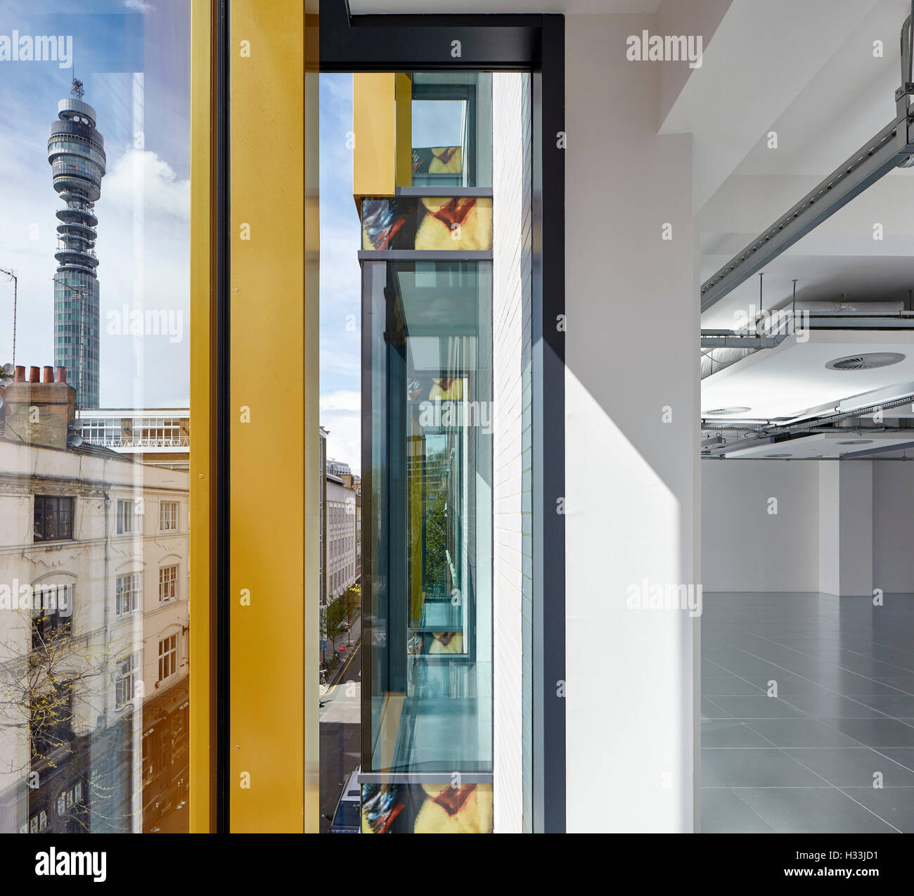 Looking out towards the BT tower. Gold anodized window frames. 46 ...
