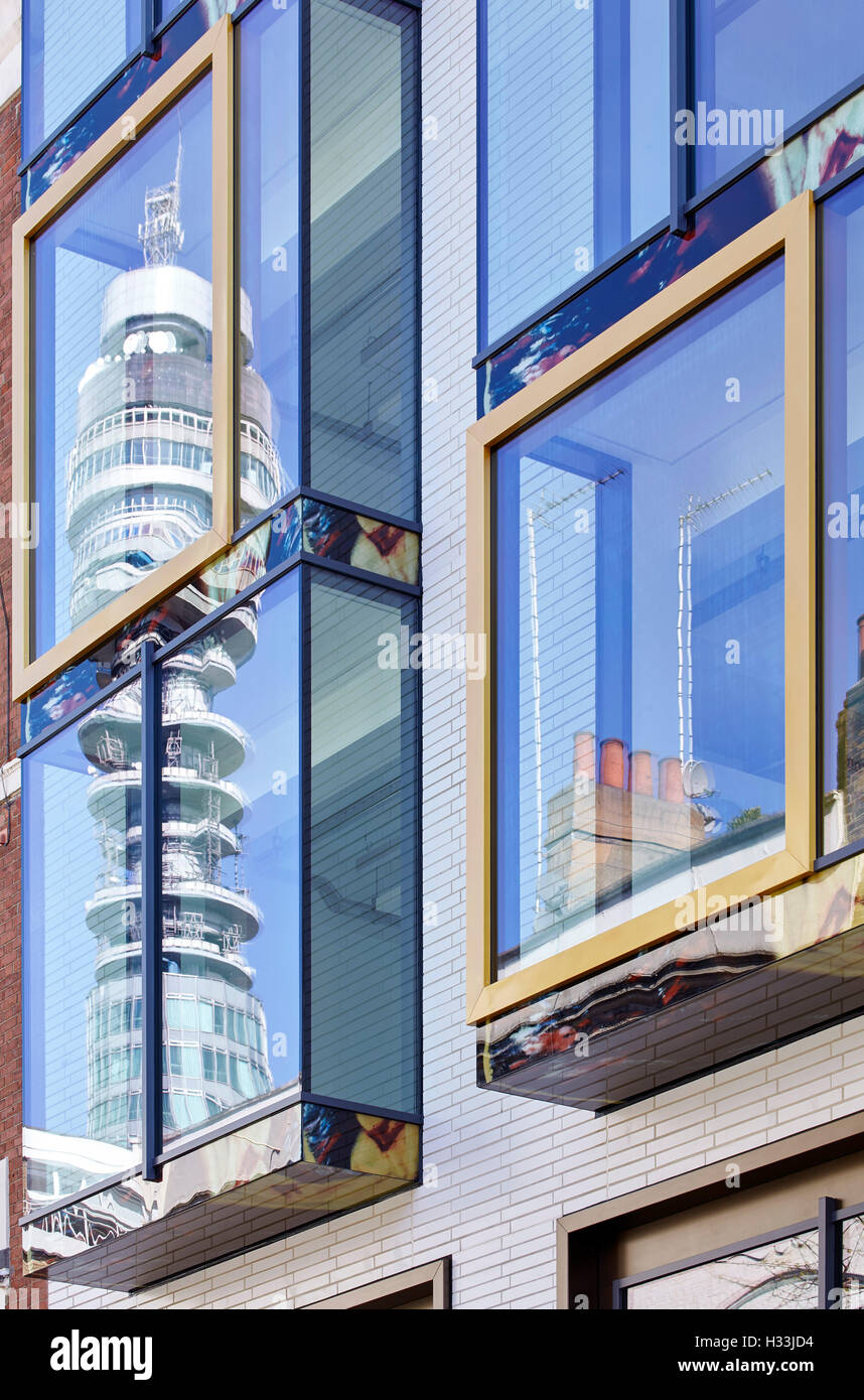 Reflection of the BT tower. View looking up the facade of the building ...