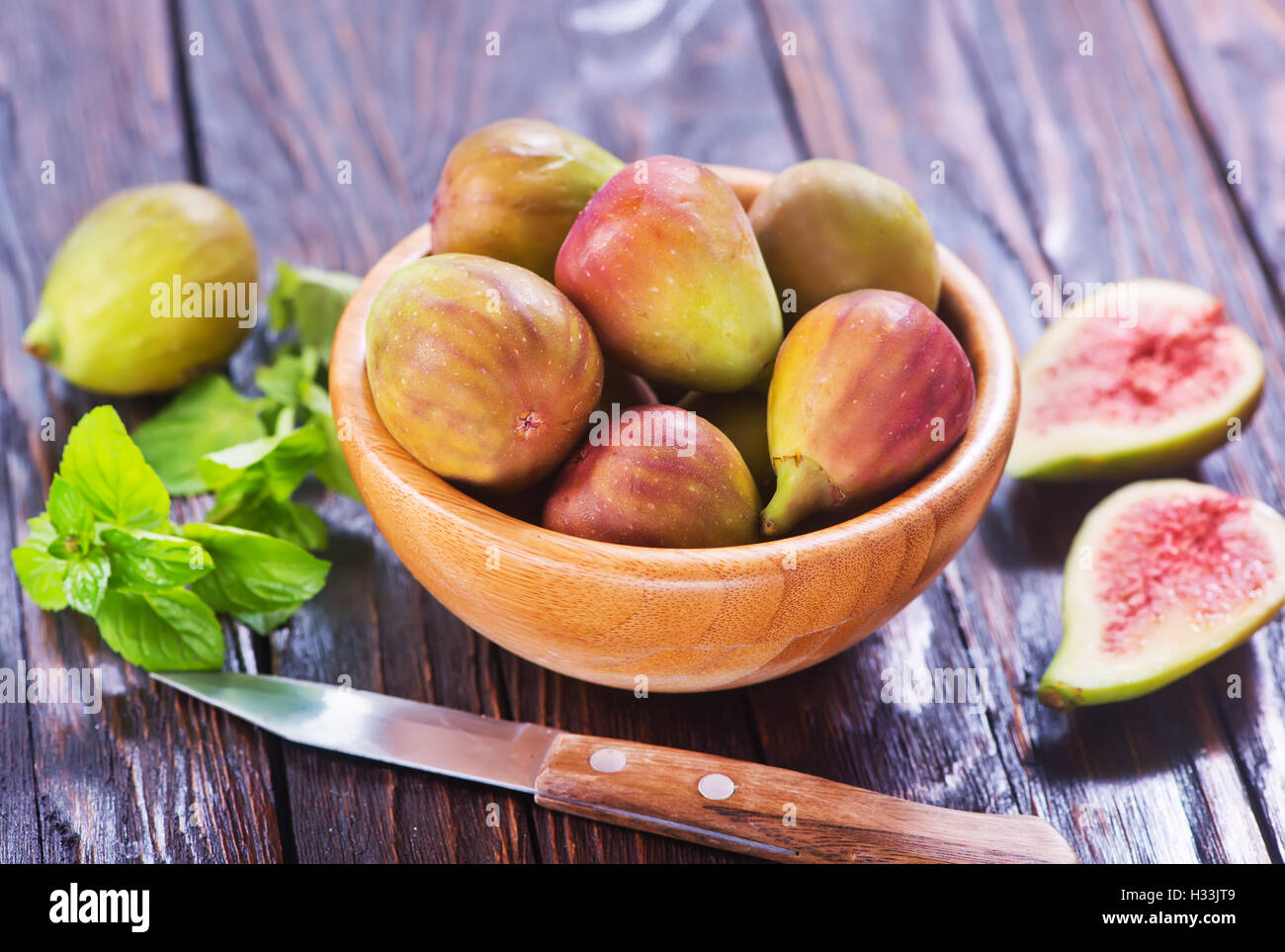 fresh figs in bowl and on a table Stock Photo - Alamy