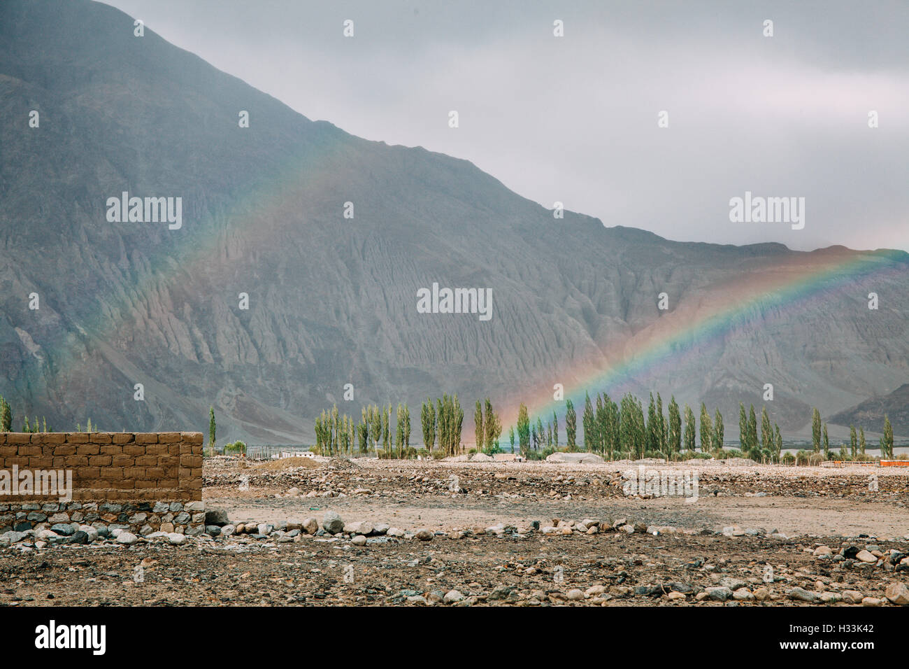 two rainbows after raining in highland mountain area in Leh, India ...