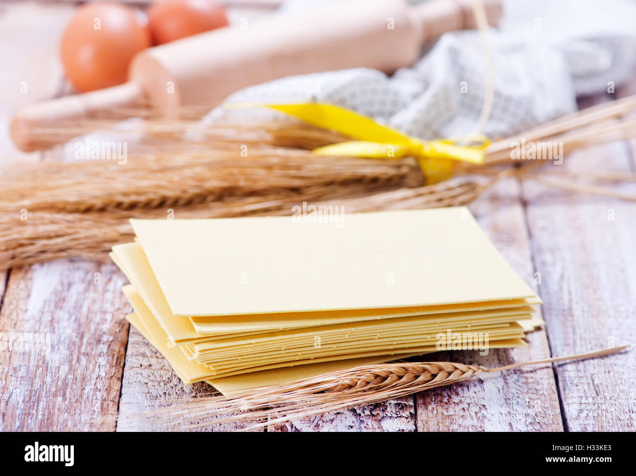 sheets for lasagna on the white table Stock Photo - Alamy