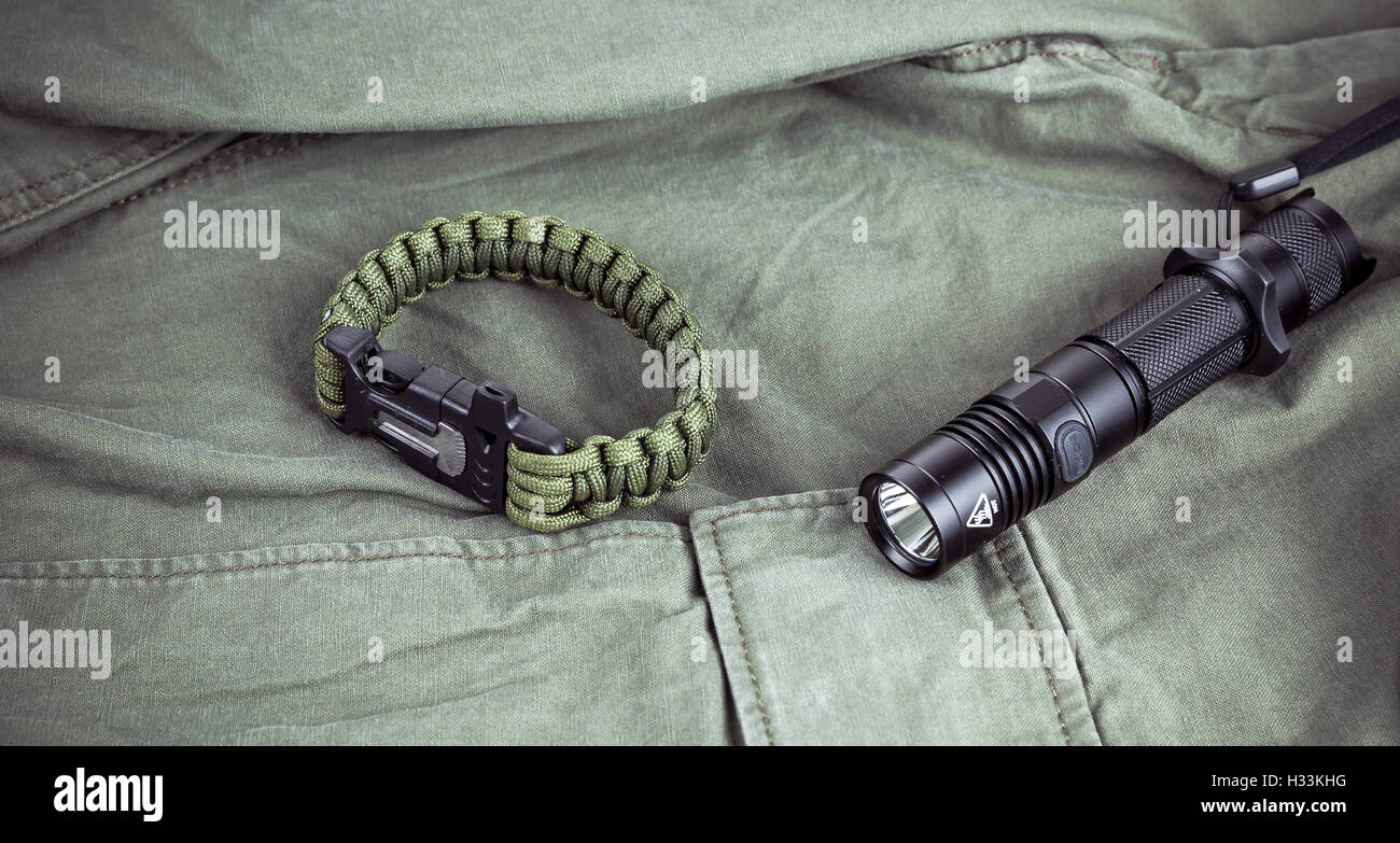 Military paracord bracelet and tactical torch Stock Photo - Alamy