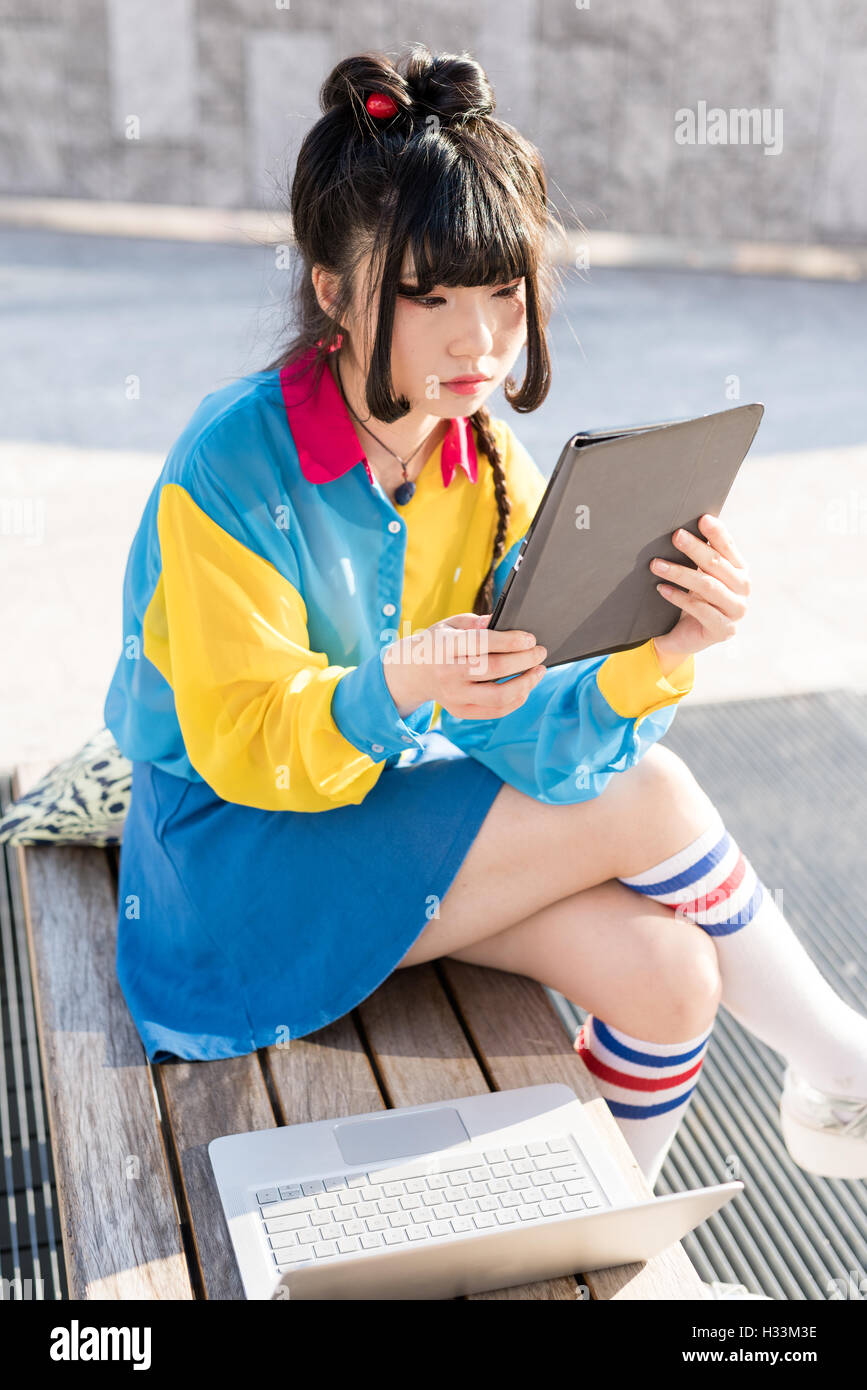 young beautiful asian millennial woman nonconformist outdoor in the ...