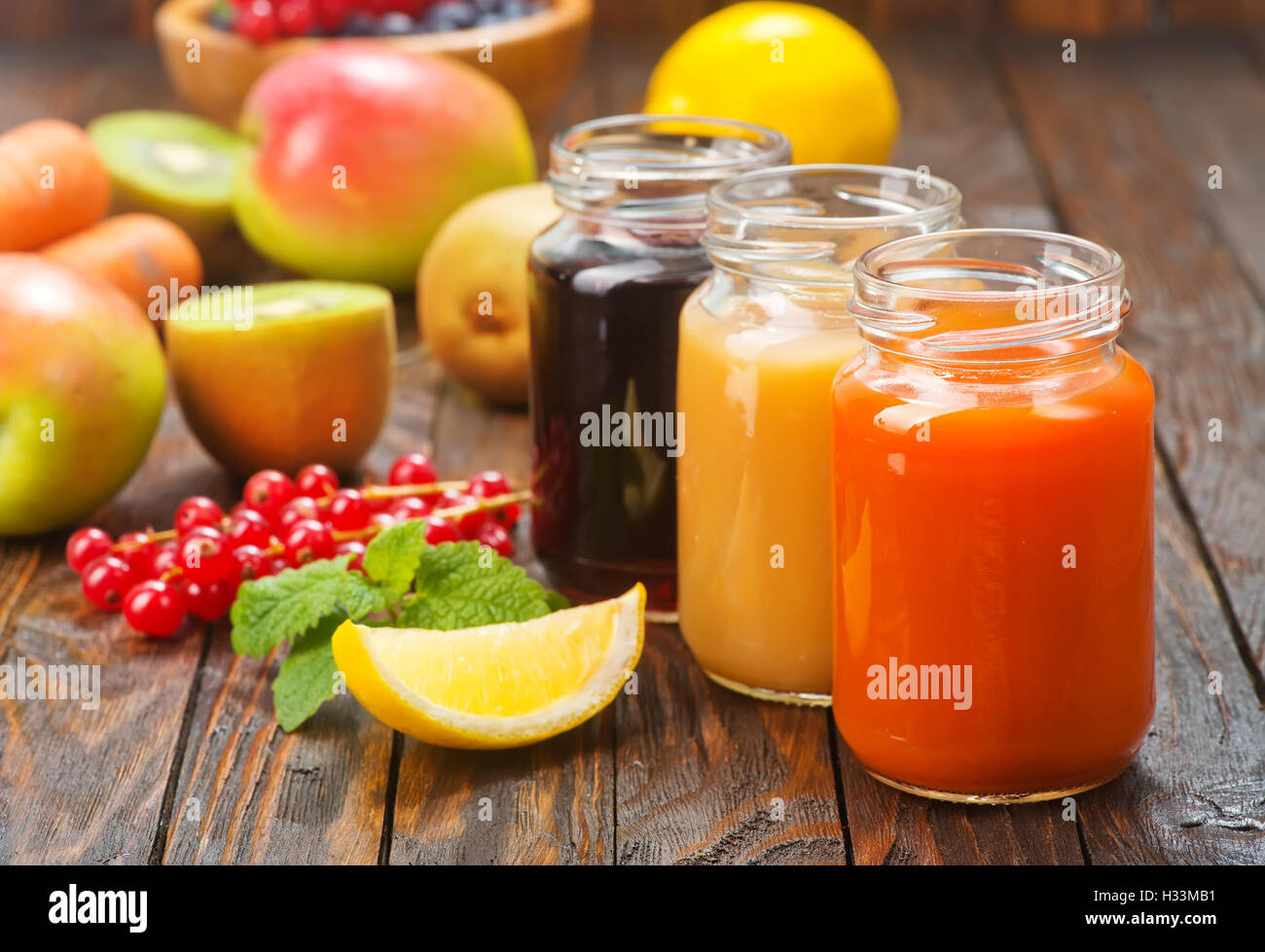 juice from fruit and vegetables in the bank Stock Photo - Alamy