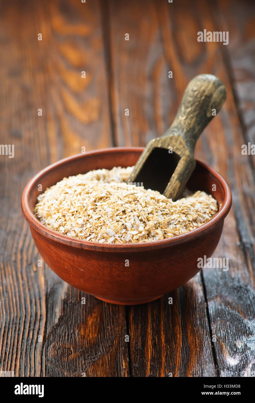 oat bran in bowl and on a table Stock Photo - Alamy