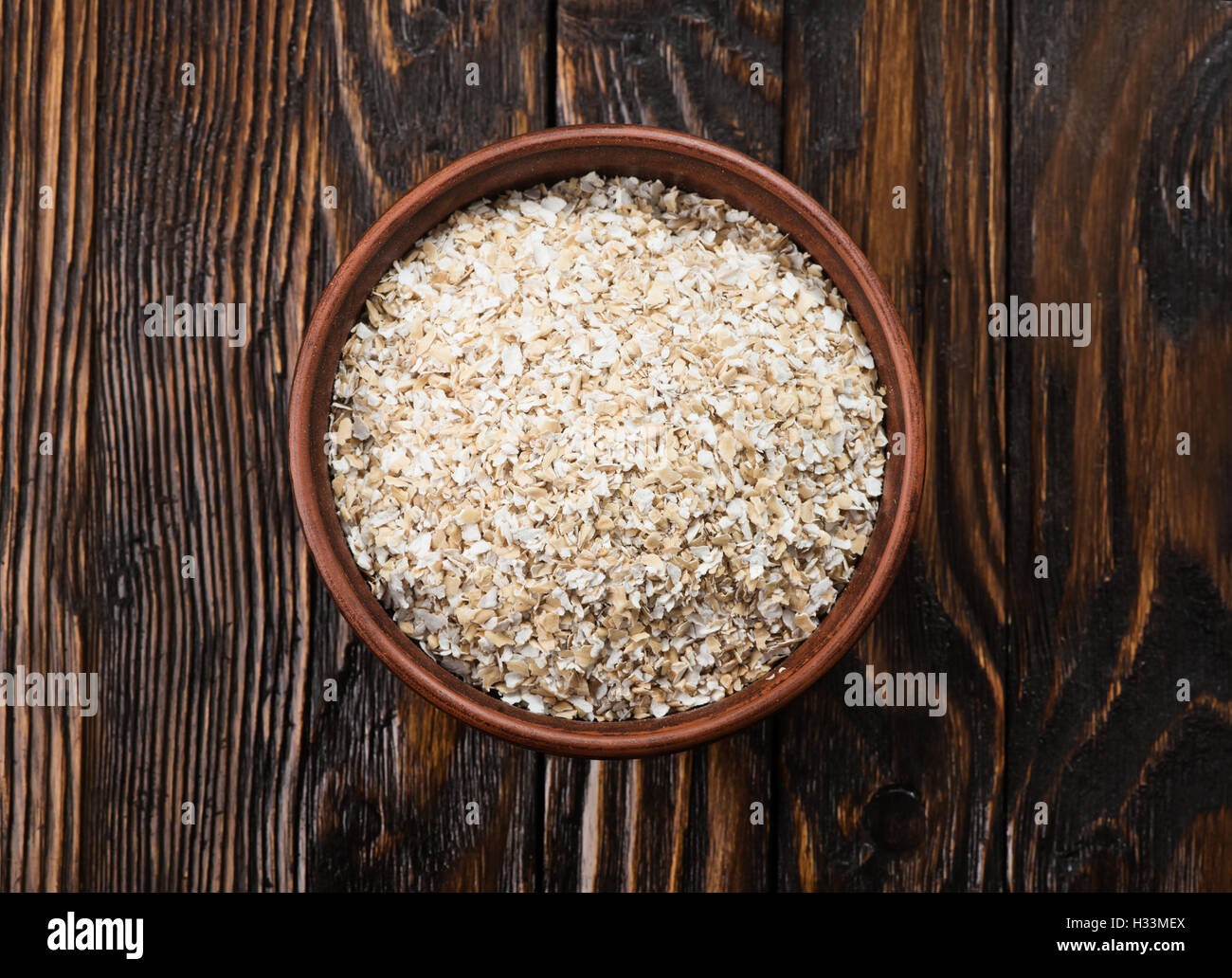 oat bran in bowl and on a table Stock Photo - Alamy