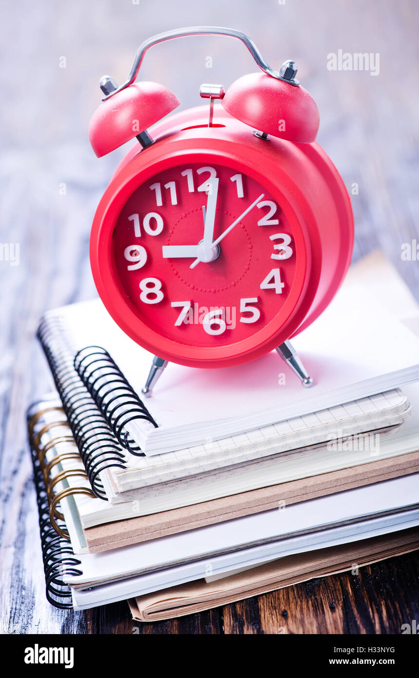 Stack of spiral notebooks on a table Stock Photo - Alamy