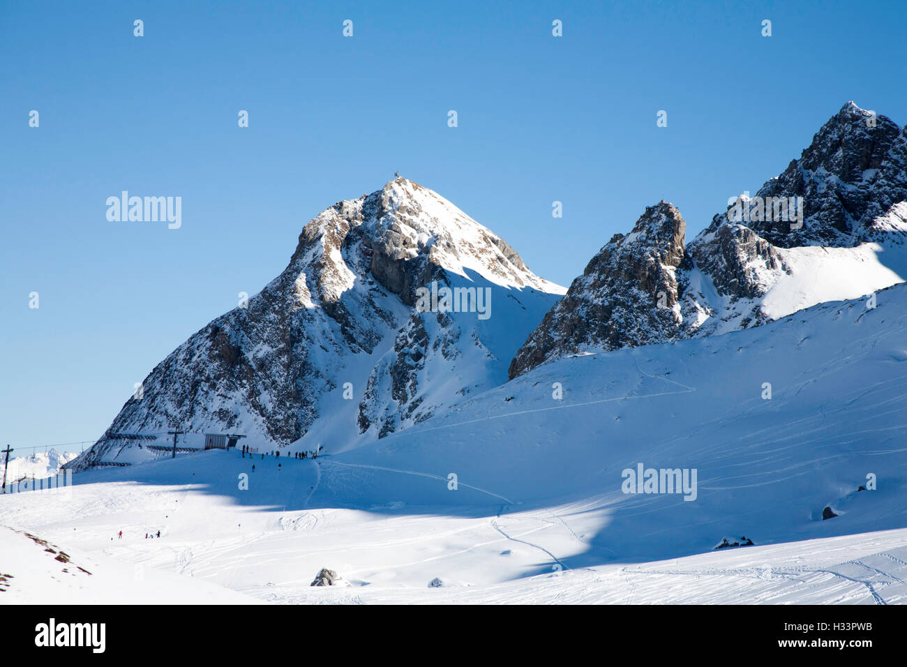 Rock faces and ridges beneath the Mohnenfluh above Lech Arlberg Austria ...
