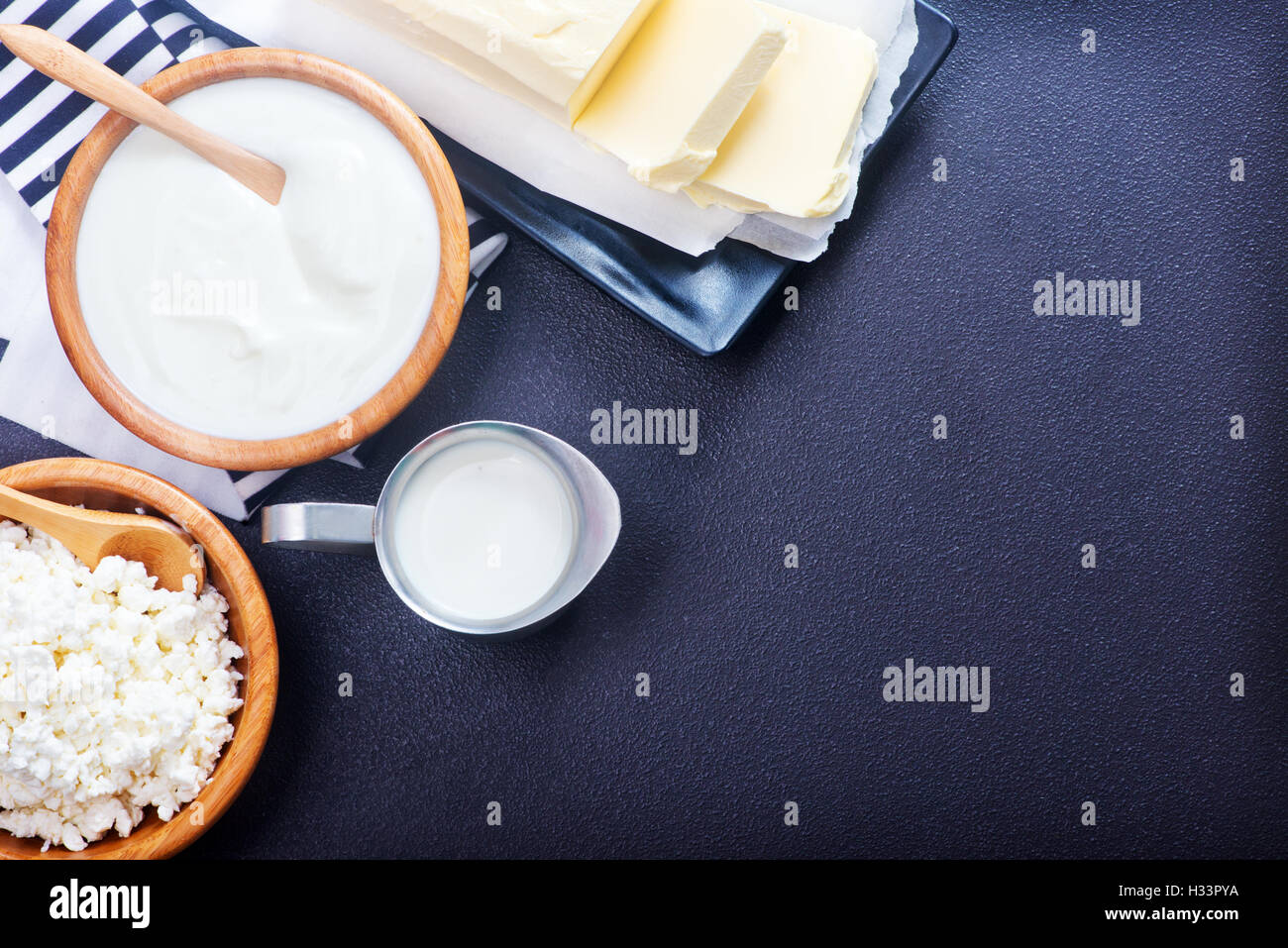 milk products on the black table, butter and milk Stock Photo - Alamy