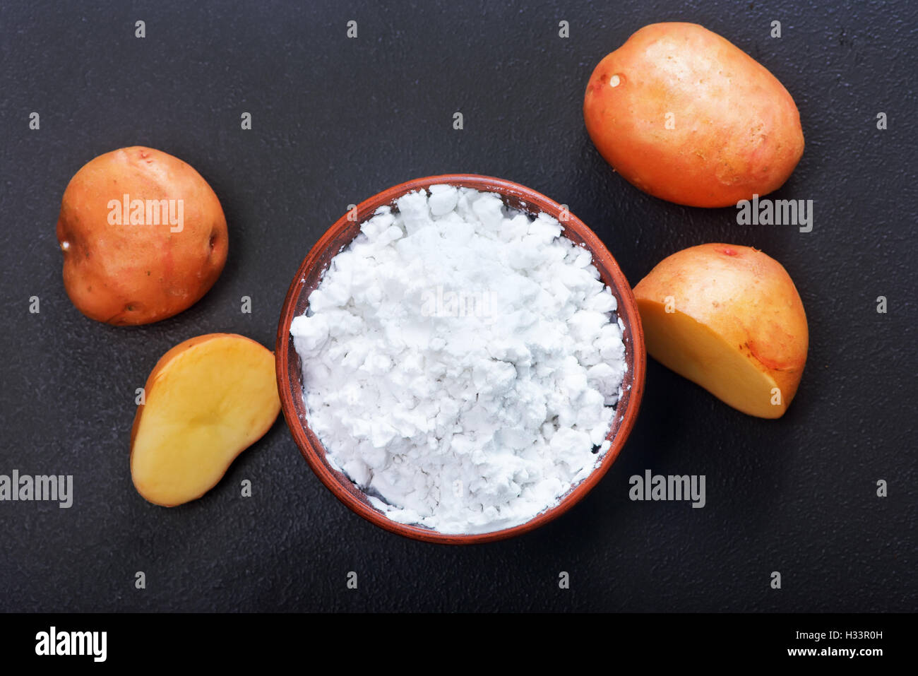 potato starch in bowl and on a table Stock Photo - Alamy