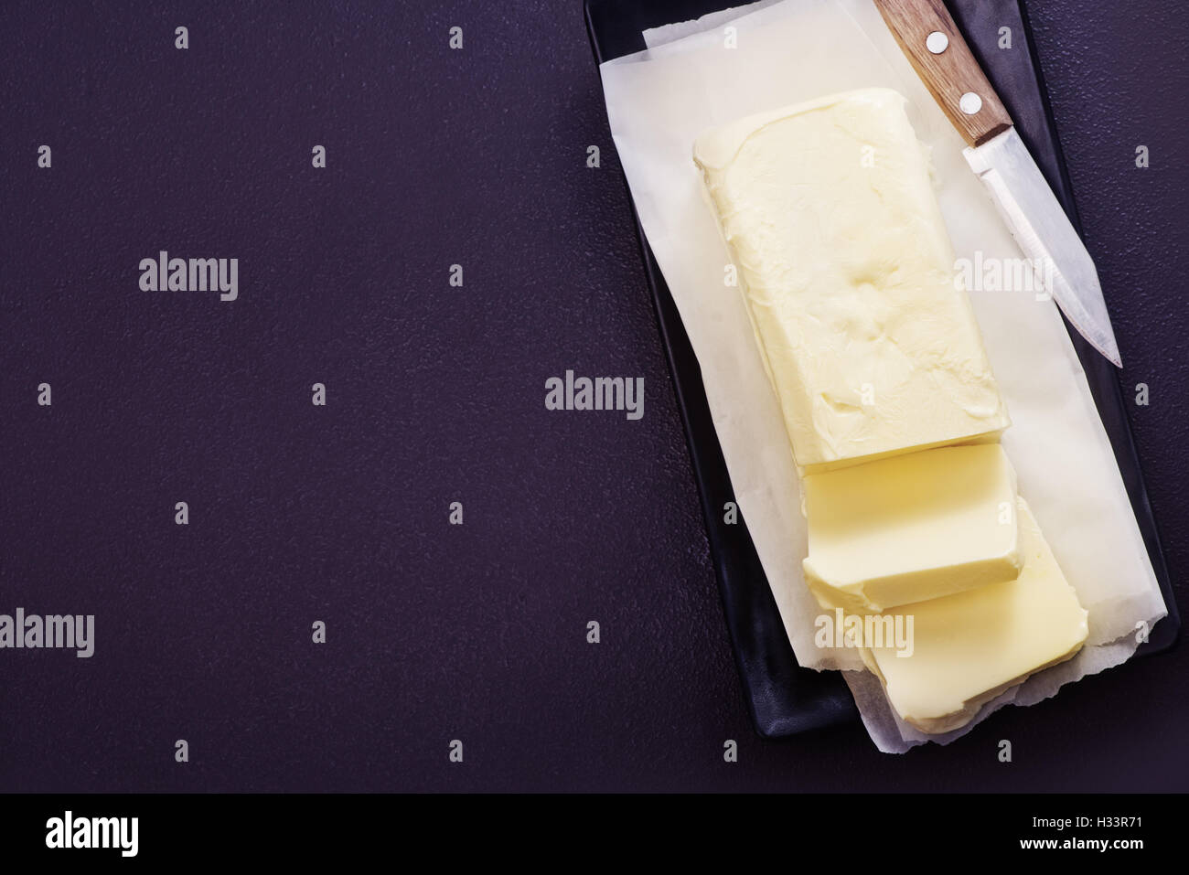 butter on plate and on a table Stock Photo - Alamy