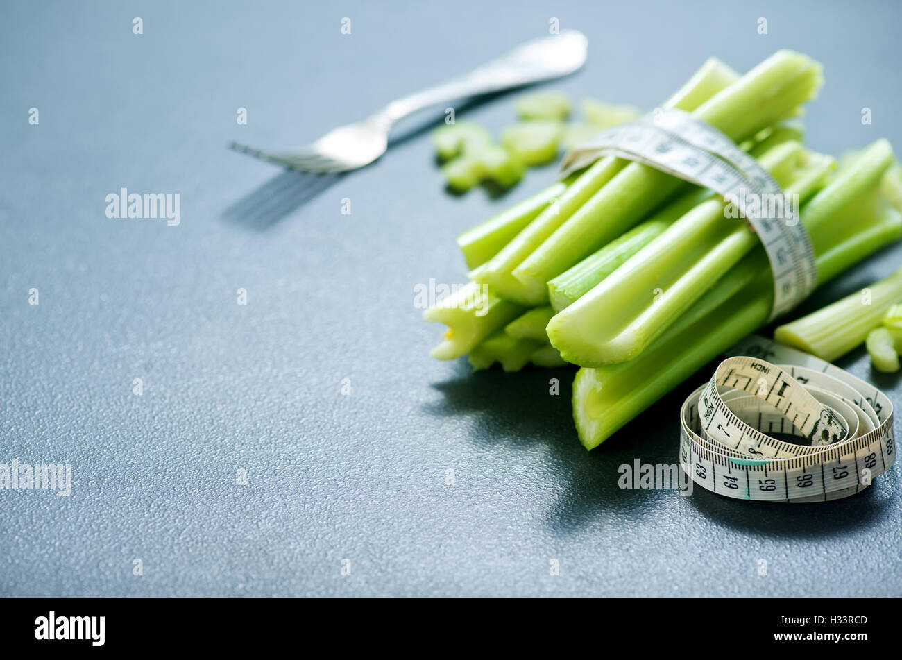 raw celery on black table, fresh celery Stock Photo - Alamy