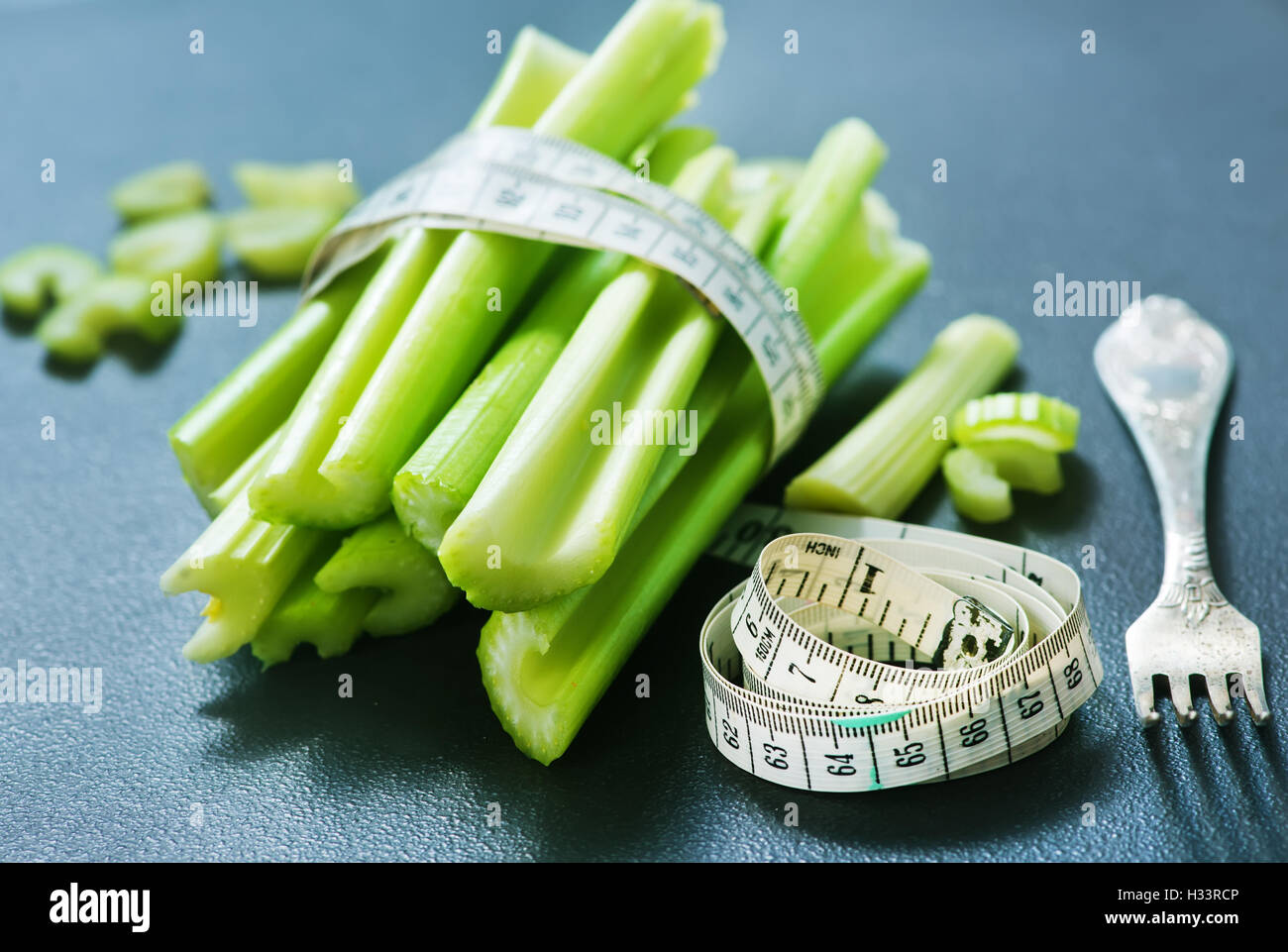 raw celery on black table, fresh celery Stock Photo - Alamy