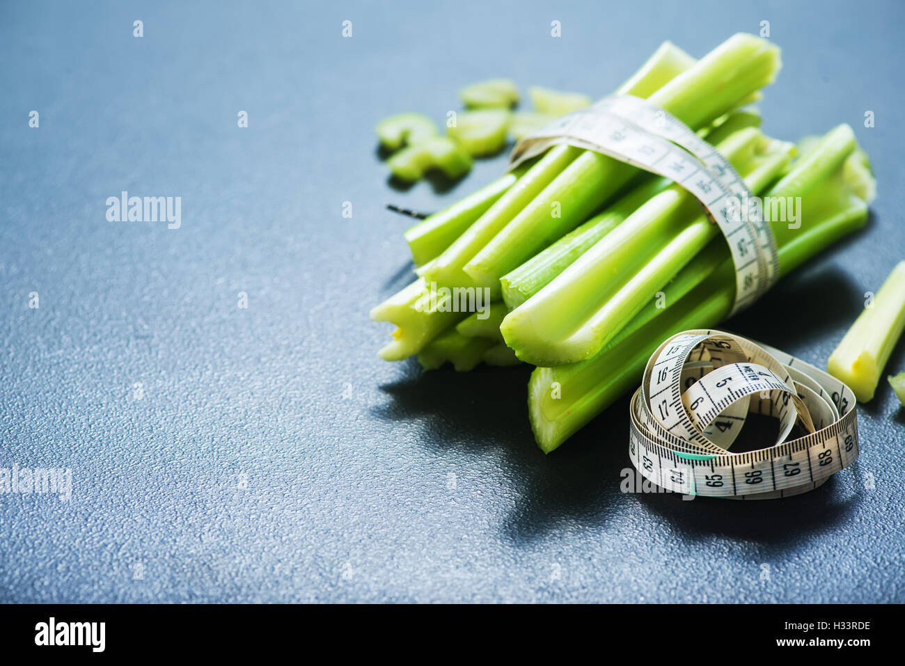 raw celery on black table, fresh celery Stock Photo - Alamy