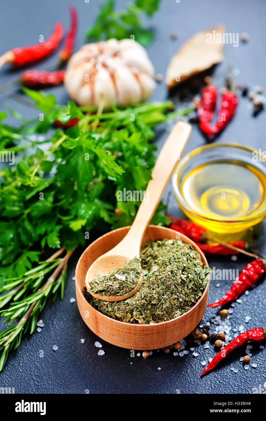 dry parsley and other spice on a table Stock Photo - Alamy