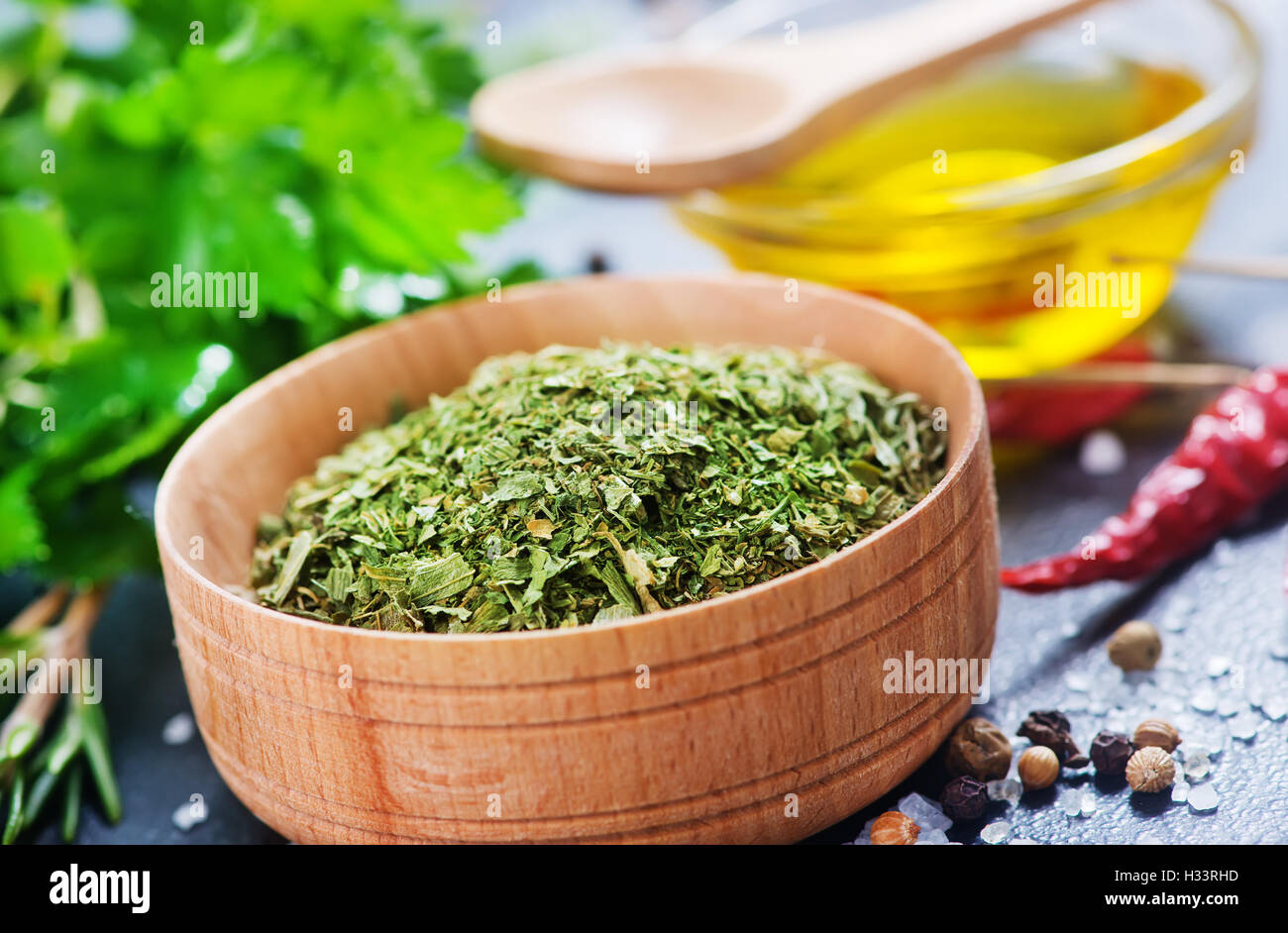 dry parsley and other spice on a table Stock Photo - Alamy
