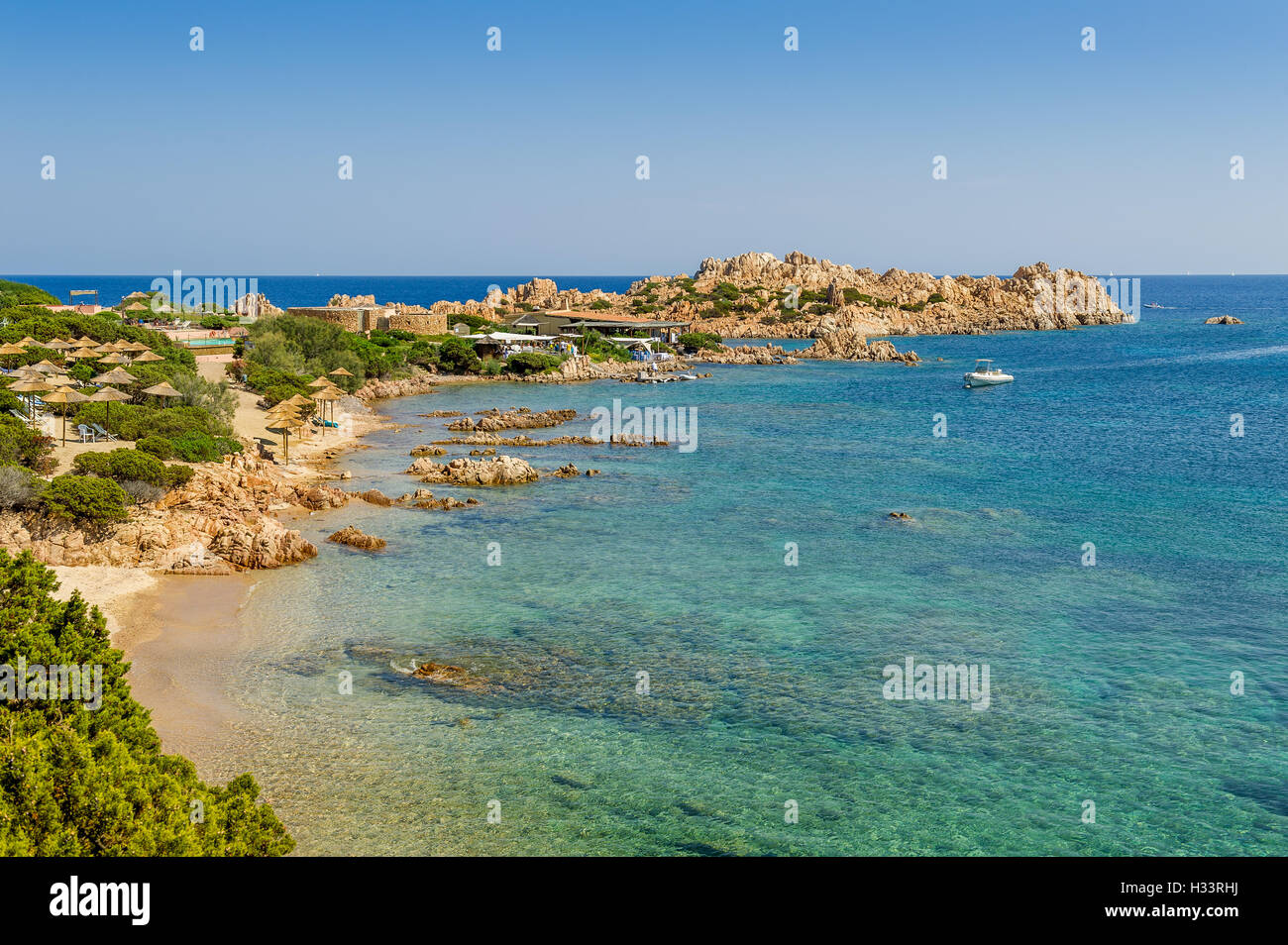 Porto Massimo sand beach ,and sailing yachts at anchor Stock Photo - Alamy