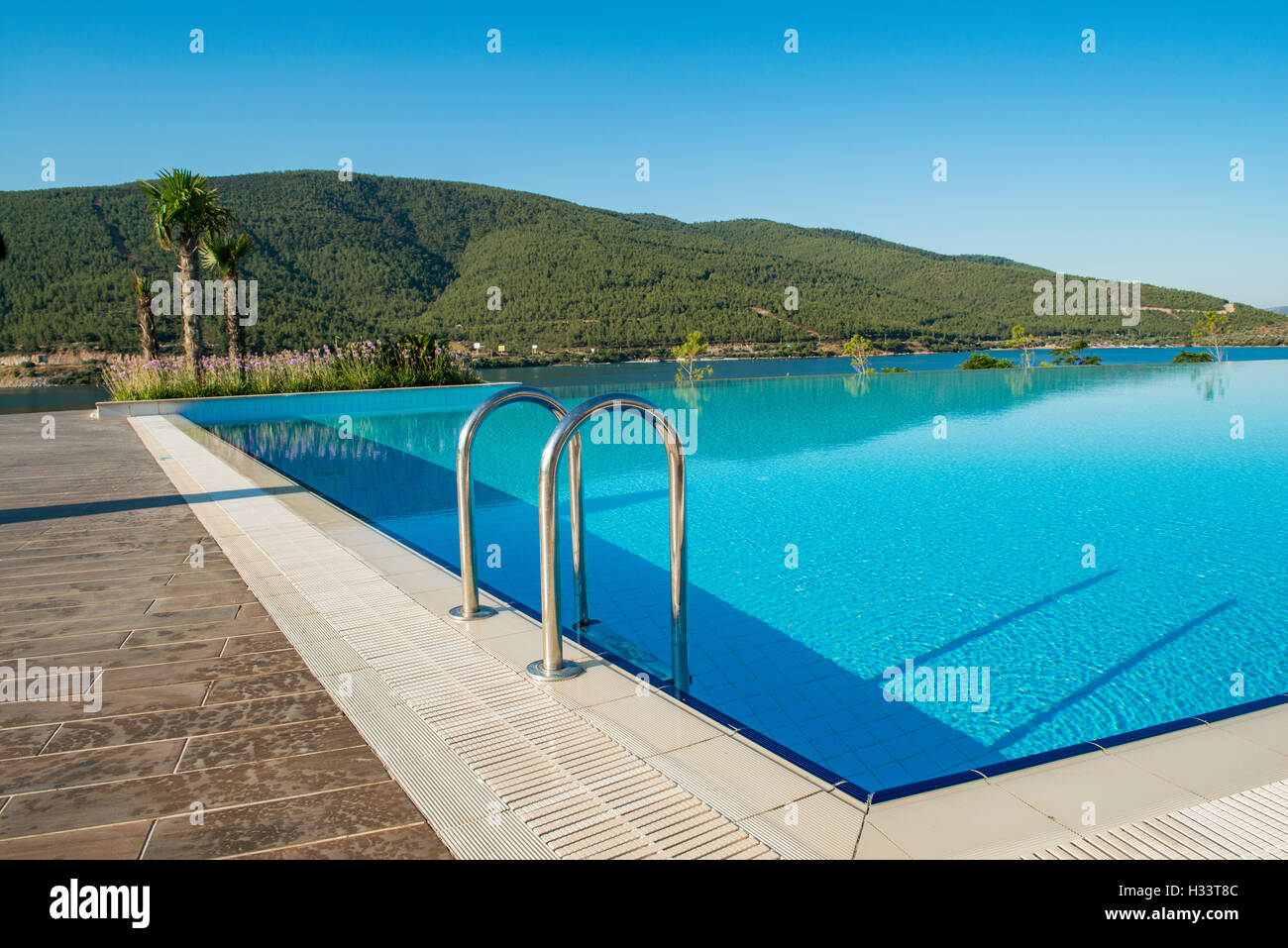 Nice swimming pool outdoors on bright summer day Stock Photo - Alamy