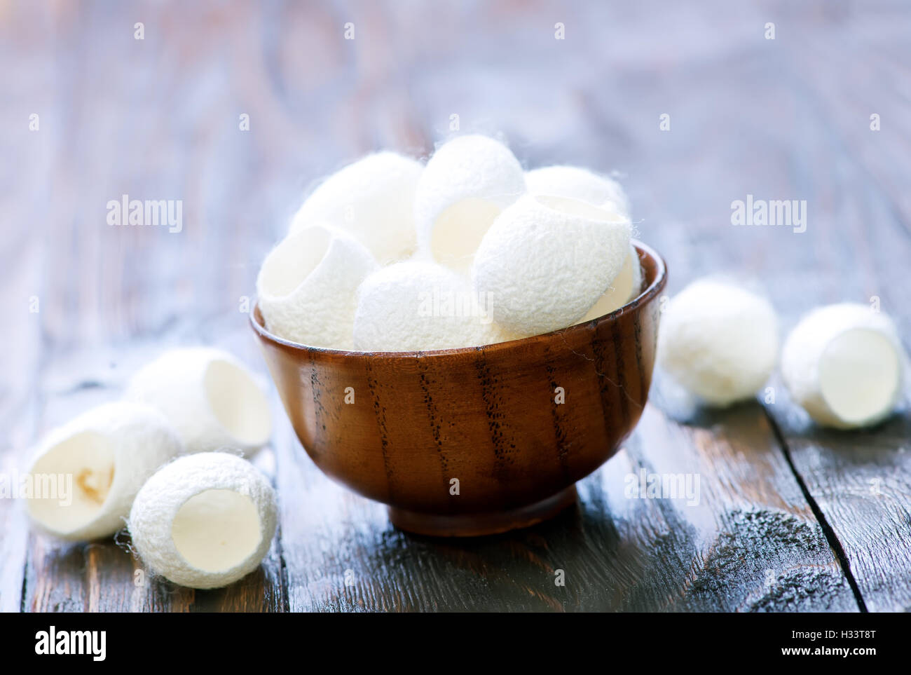 cotton swabs in bowl and on a table Stock Photo - Alamy