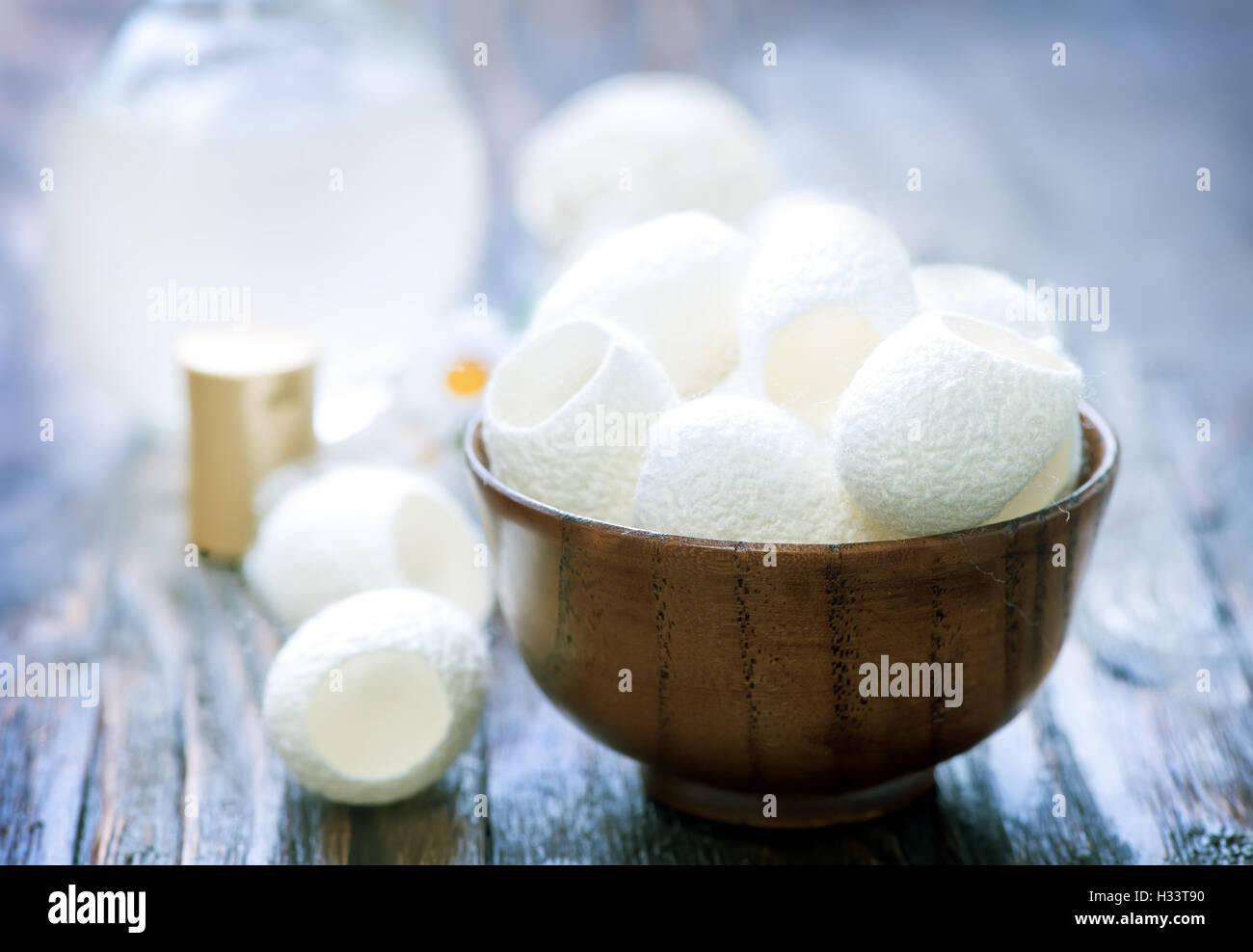 cotton swabs in bowl and on a table Stock Photo - Alamy