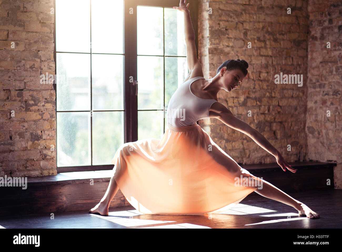Elegant female dancer moving gracefully Stock Photo - Alamy