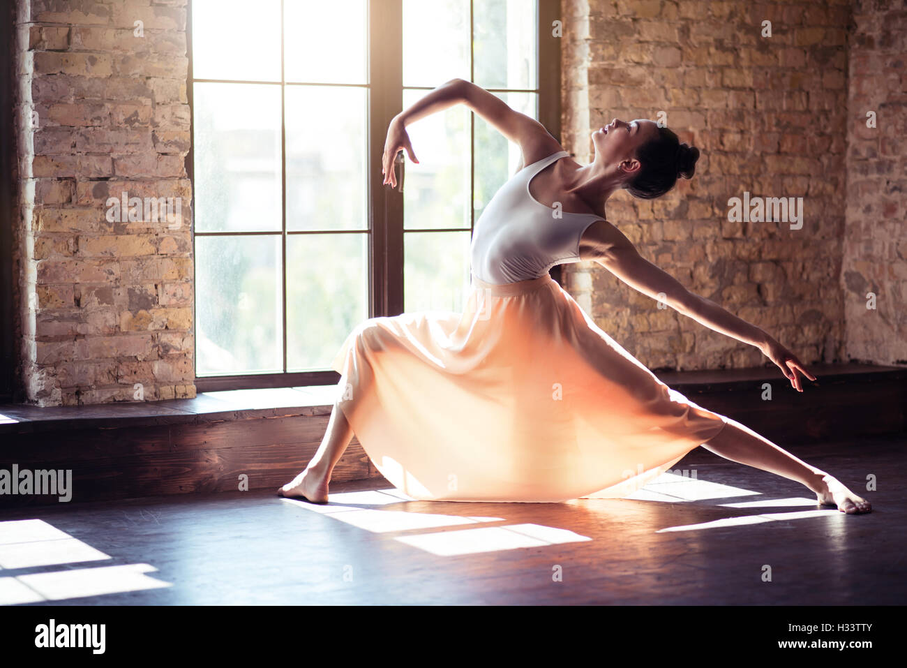 Beautiful young woman dancing Stock Photo - Alamy
