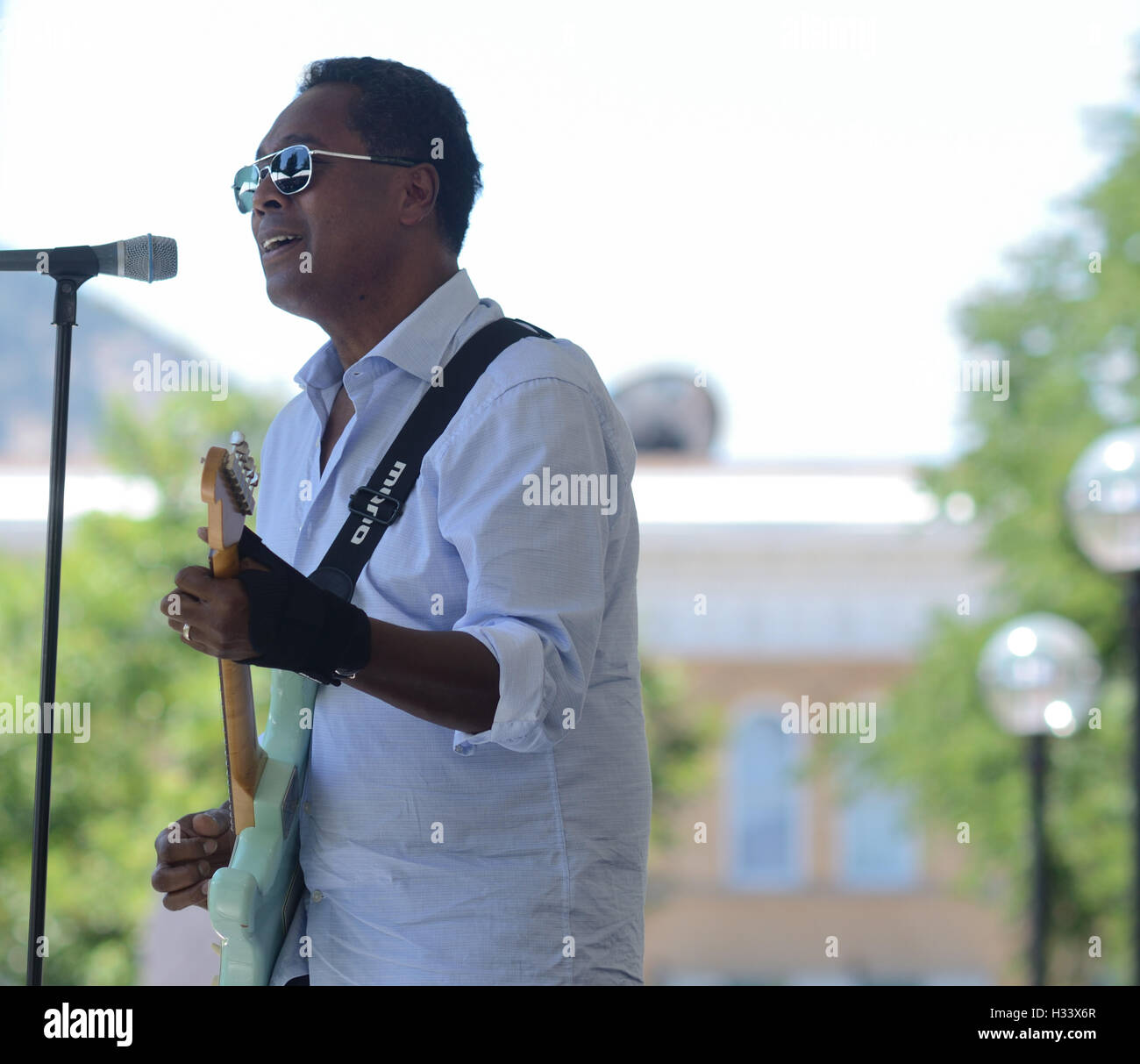 Singer and guitarist Jack Hadley plays at the Boulder Asian Festival ...