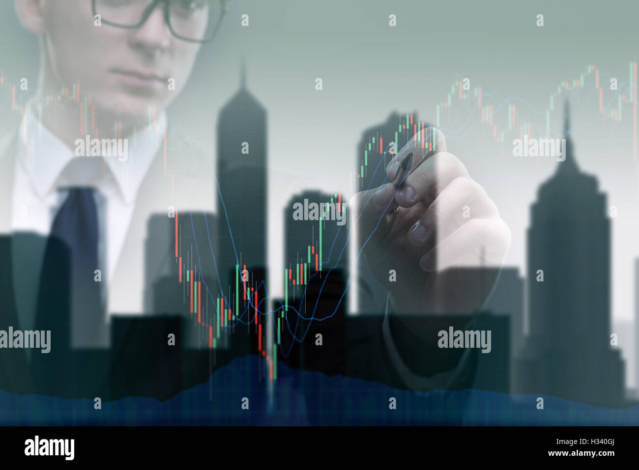 Man pressing buttons on line chart Stock Photo - Alamy