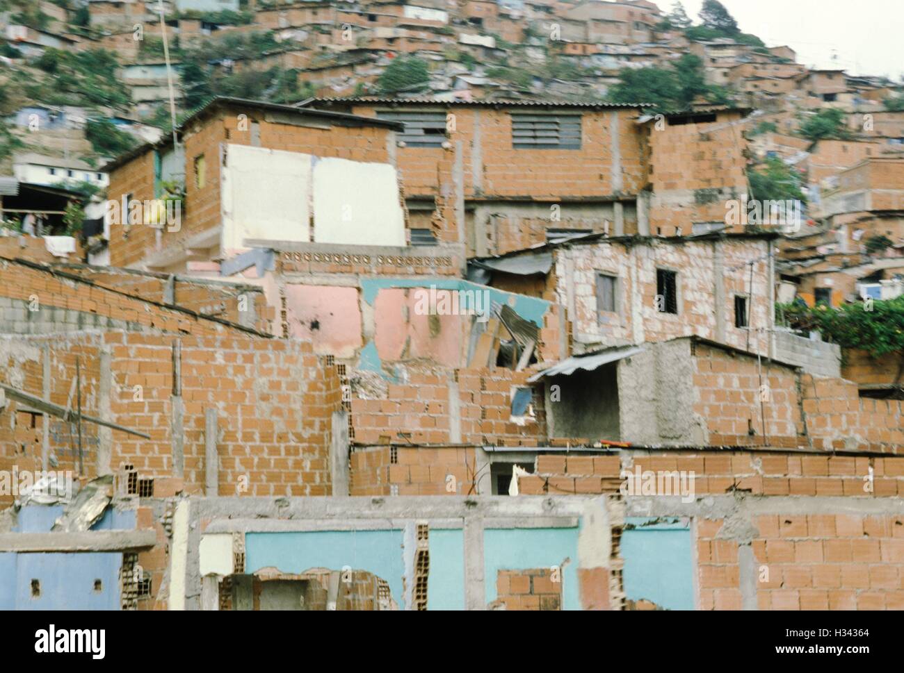 A densely populate neighborhood consisting of modest homes built on a ...