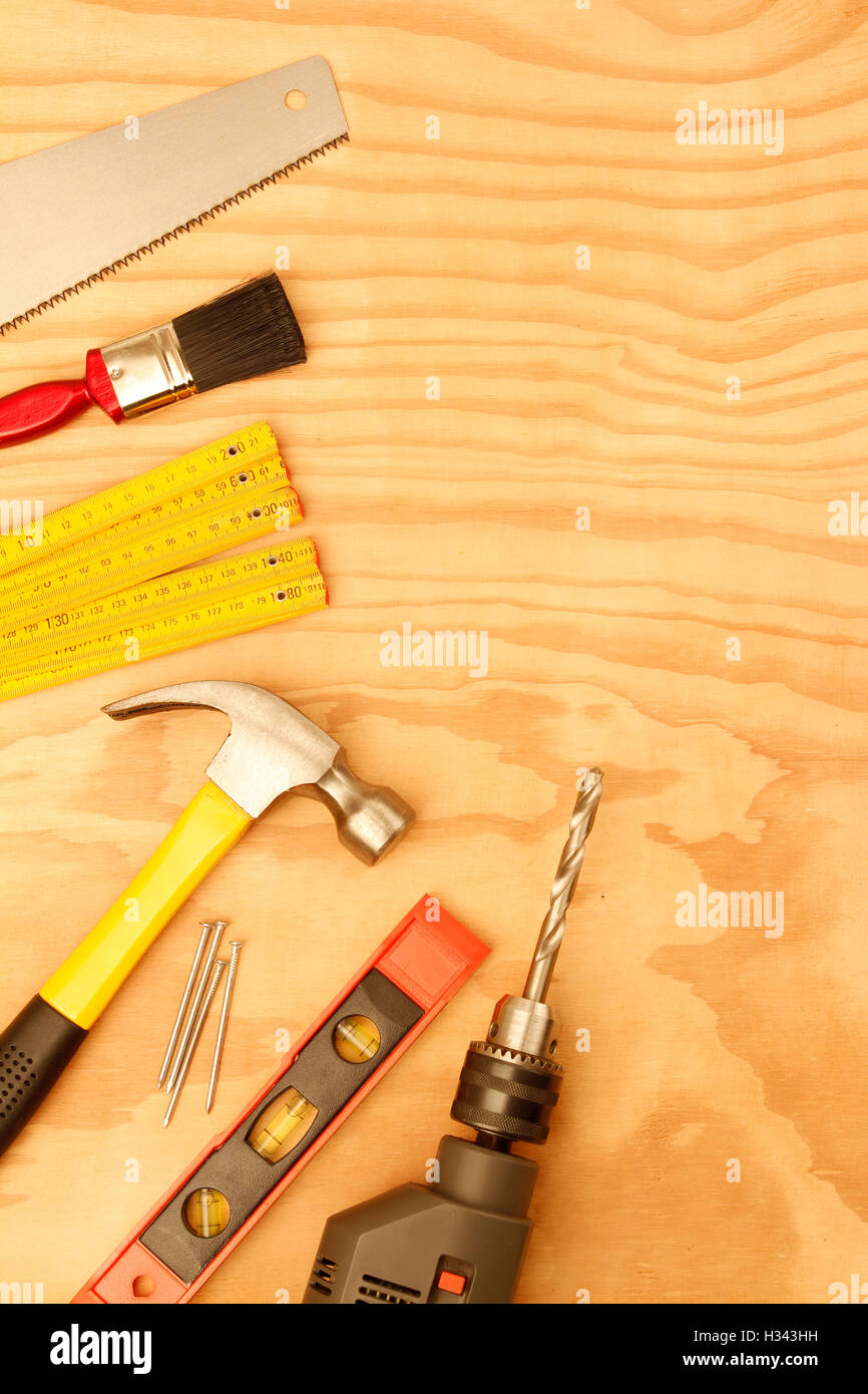 Assorted work tools on wood Stock Photo - Alamy