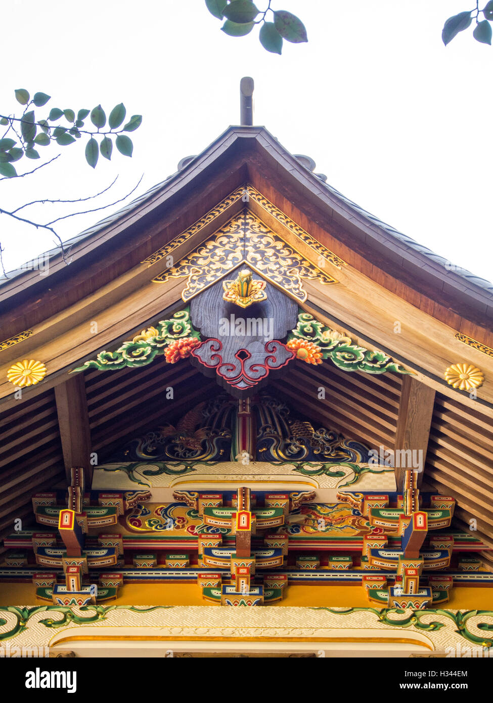 Gongen-zukuri style coloured decoration of roof gable of shinto shrine ...