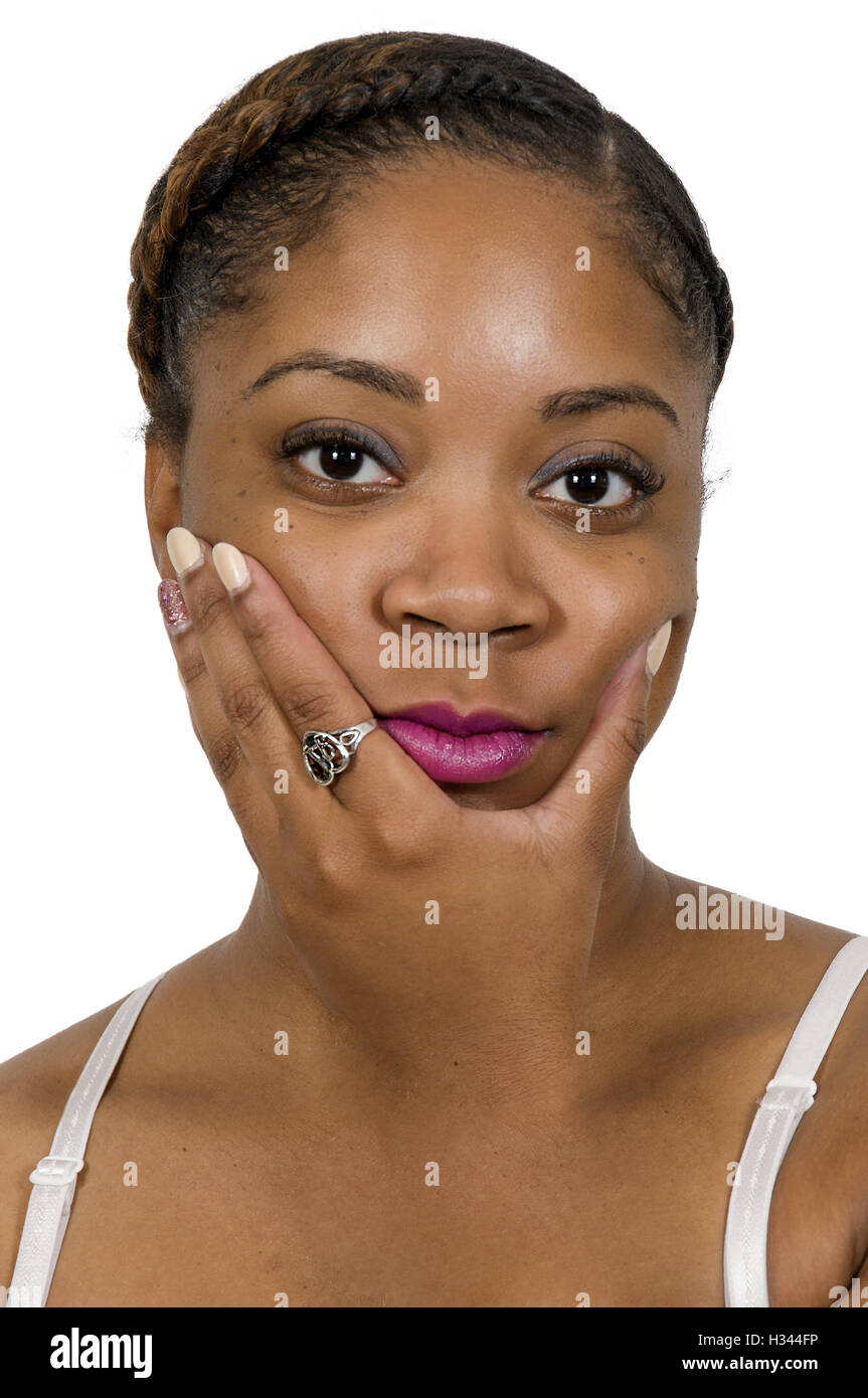 Beautiful woman holding her face with her hand Stock Photo - Alamy