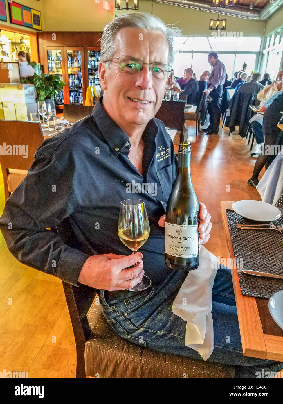 Kenn Oldfield, Chairman of Tinhorn Creek Vineyards shows off his award ...