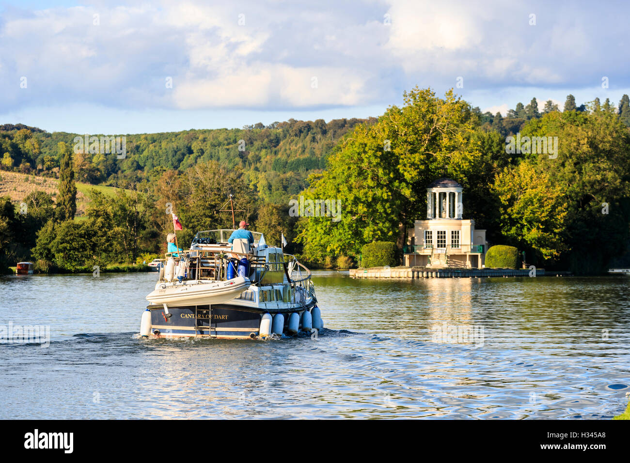 Motorboat approaching Temple Island and folly in the River Thames near ...