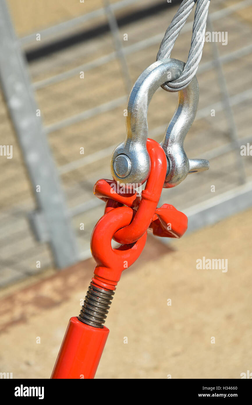 Metal fastener with steel rope for security Stock Photo - Alamy