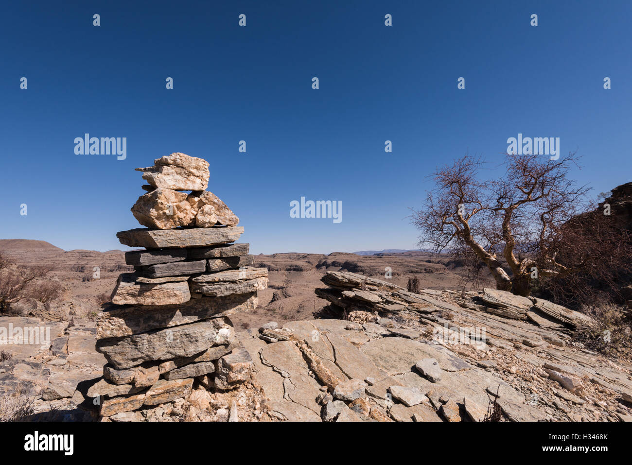 Rock Cairns along desert hiking trail, Namibia Stock Photo - Alamy