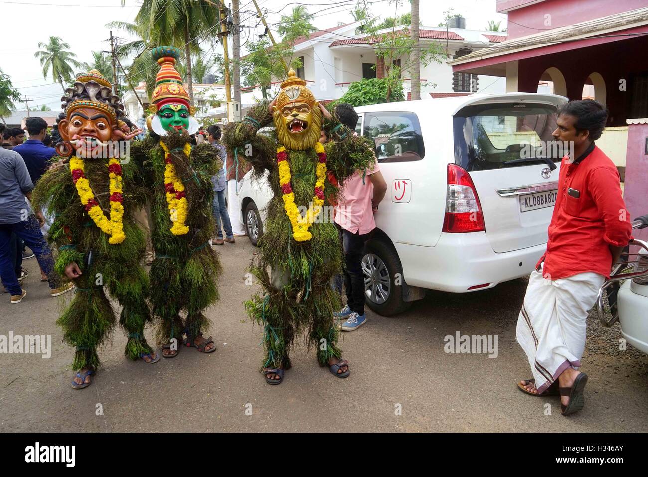 Traditional Kummatti dancers wear colourful wooden masks gods Kummatti ...