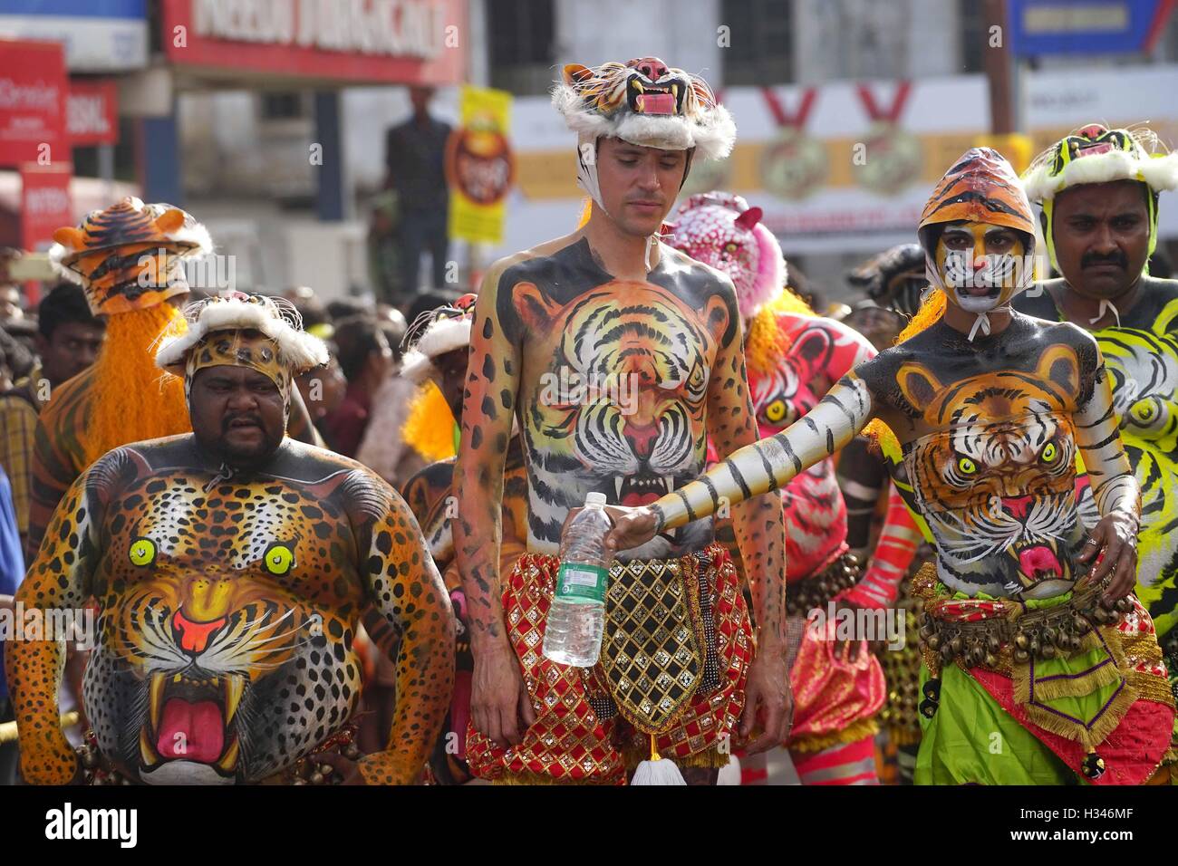 Trained dancers carefully painted bodies hi-res stock photography and ...