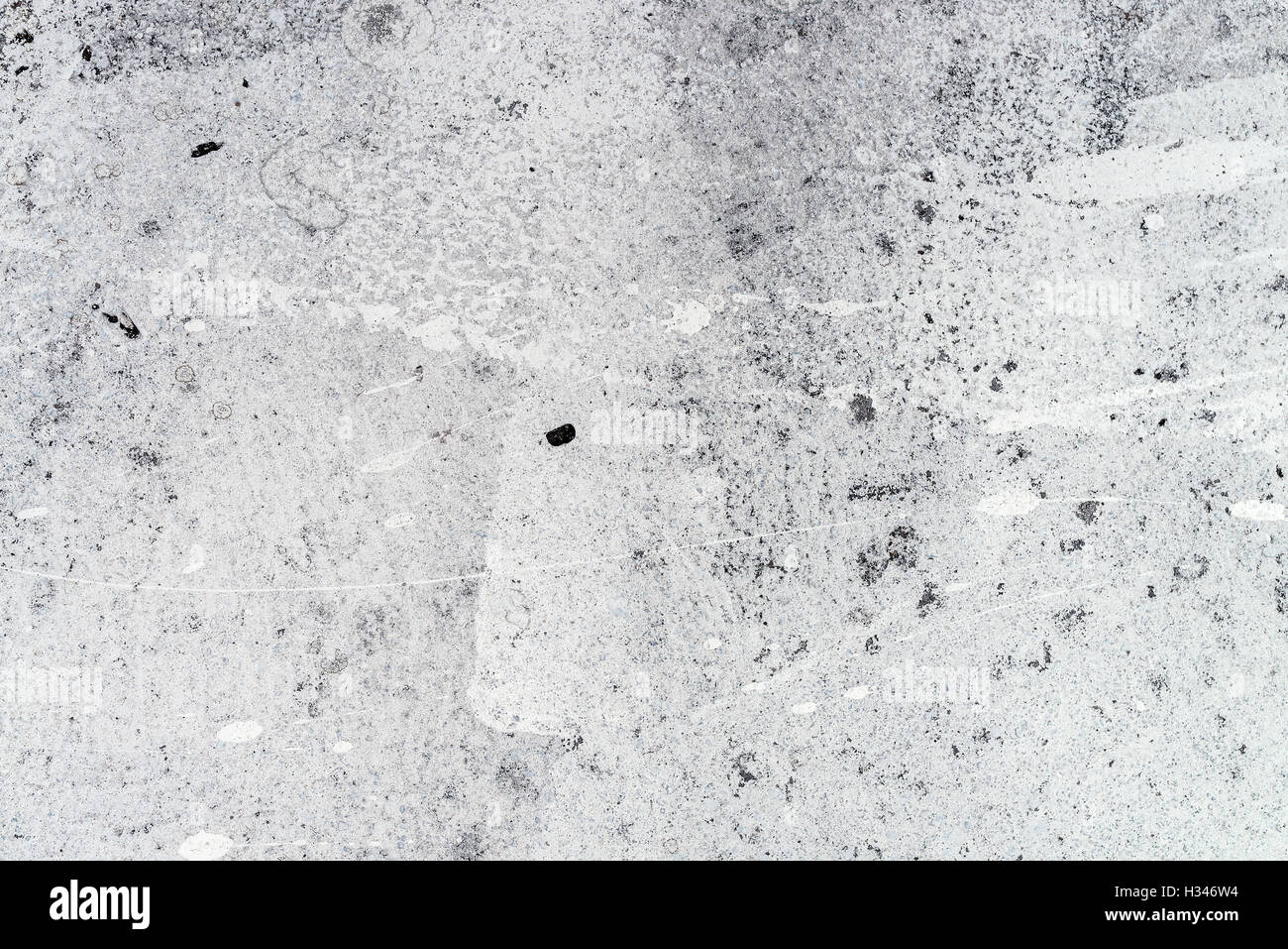 Asphalt road painted in white as grunge texture Stock Photo - Alamy