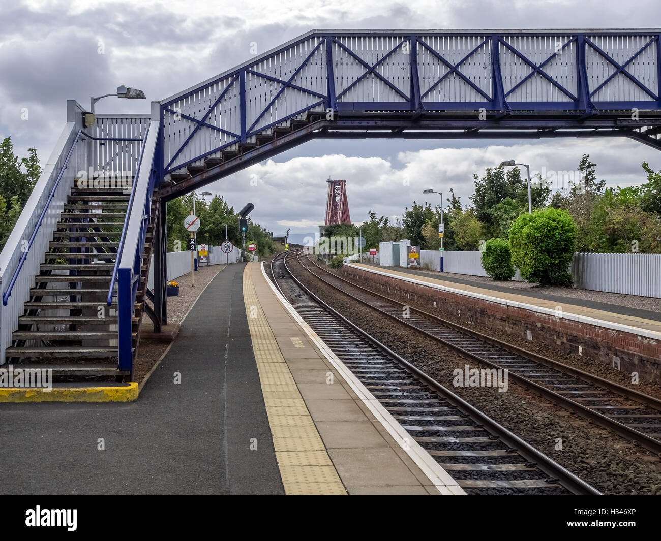 Overbridge at the train station with railtrack leading to the Forth ...