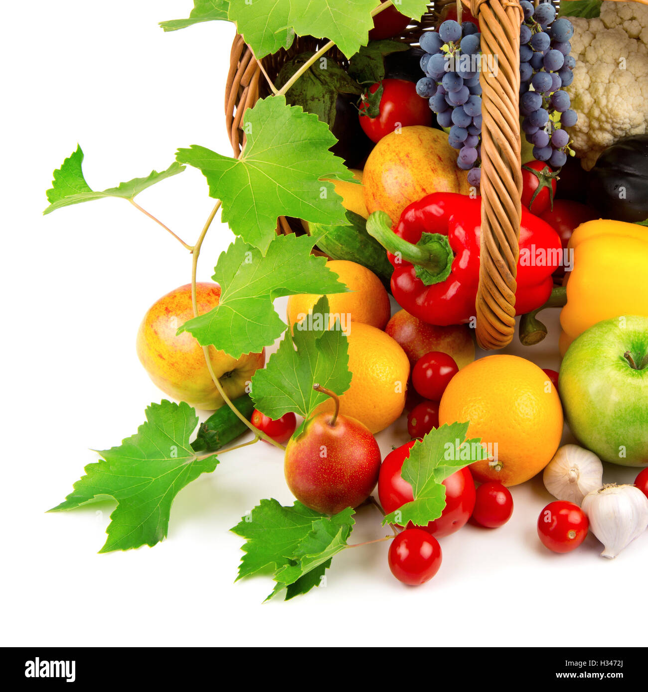 vegetables and fruits in a basket isolated on white background Stock ...