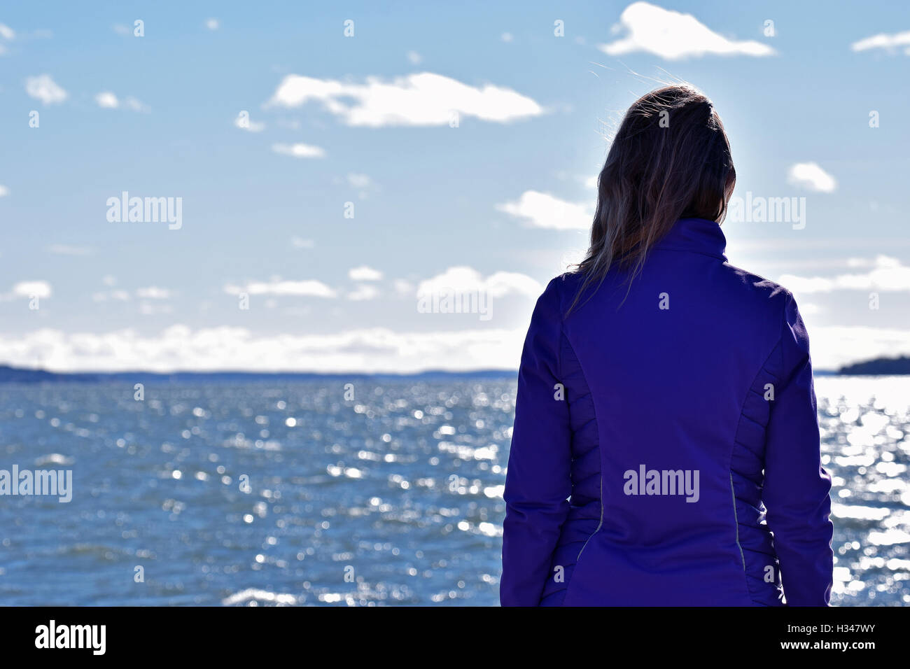 Woman watching waves hi-res stock photography and images - Alamy